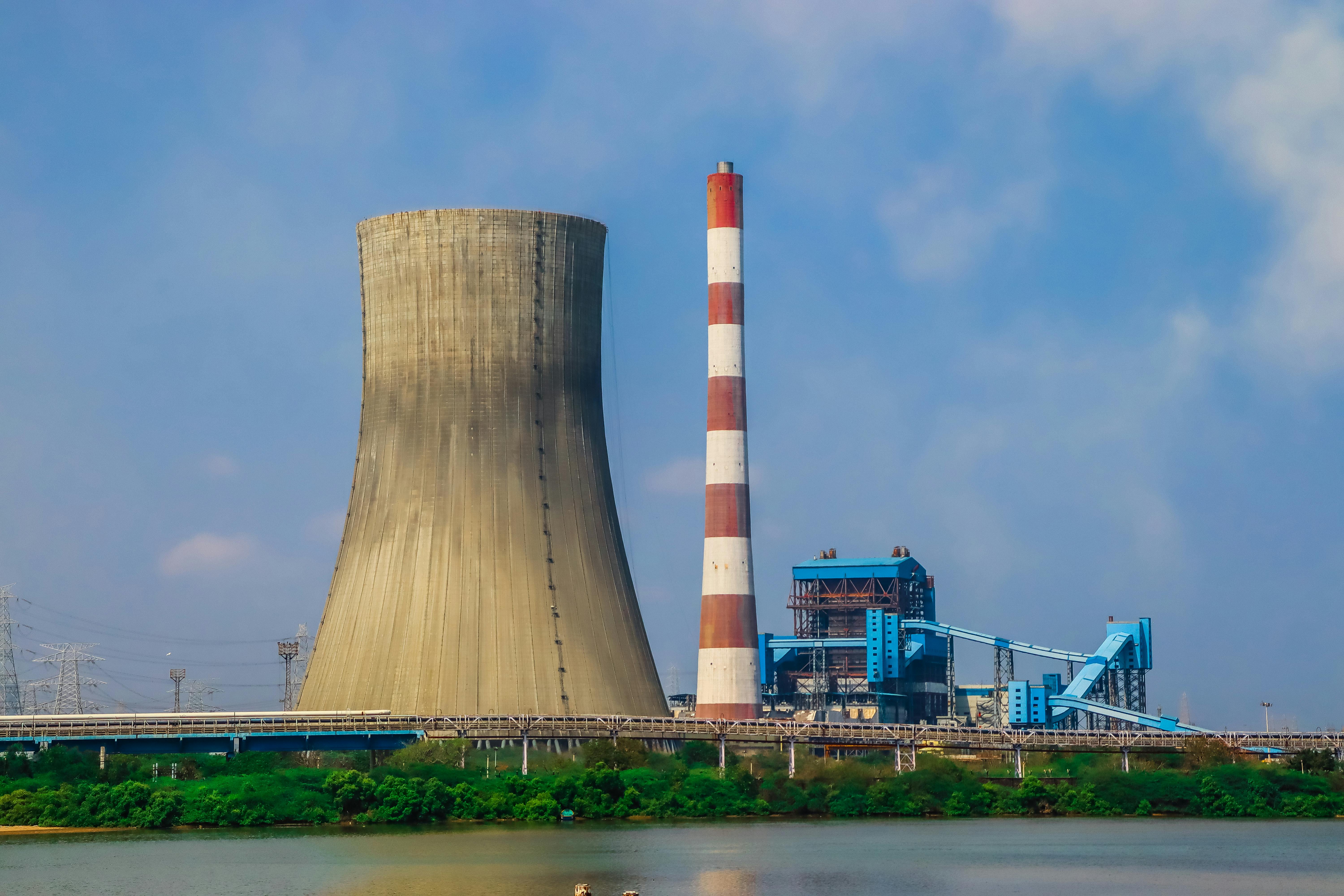 Silo and Chimney at Factory · Free Stock Photo