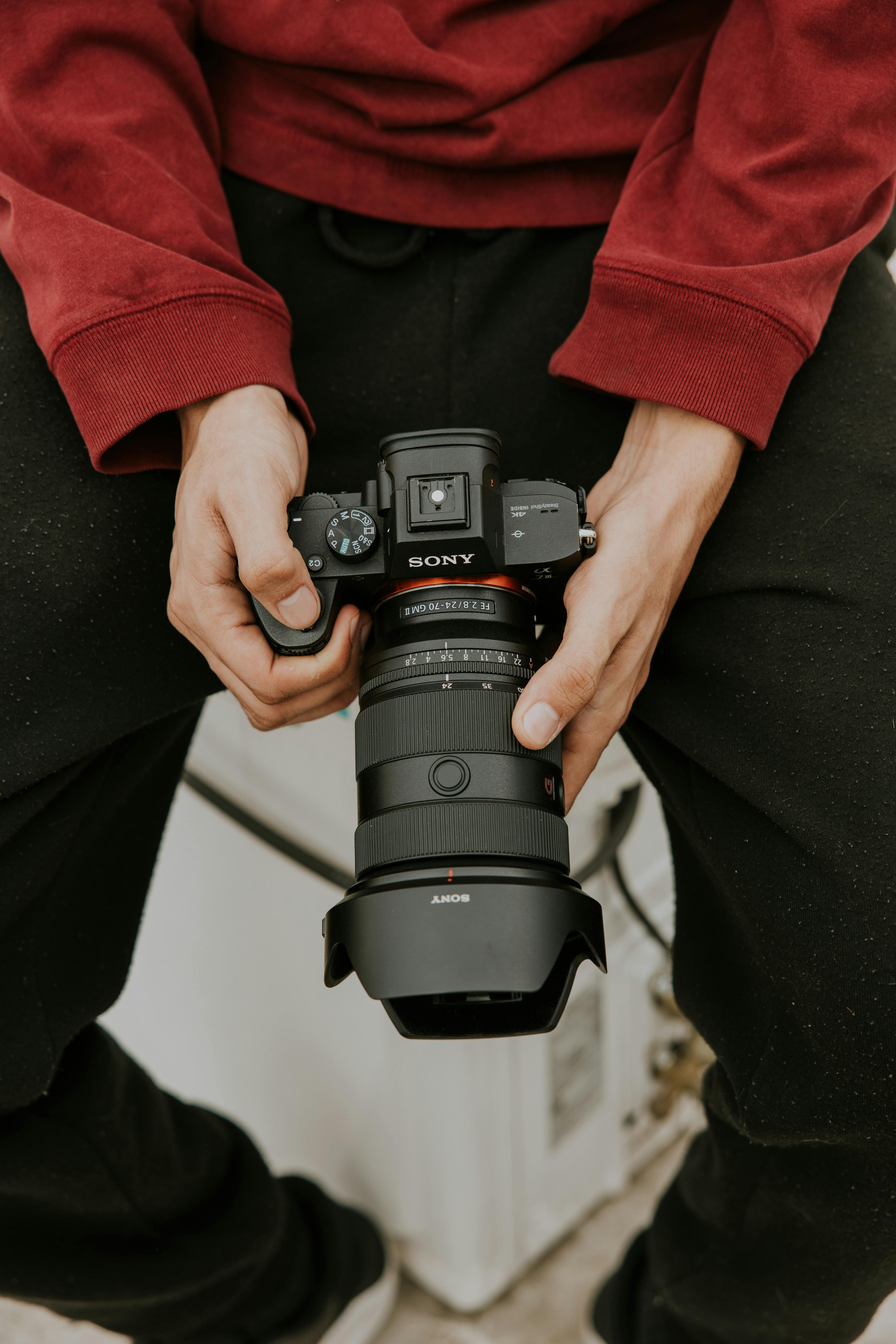 Man Hands Holding Camera · Free Stock Photo