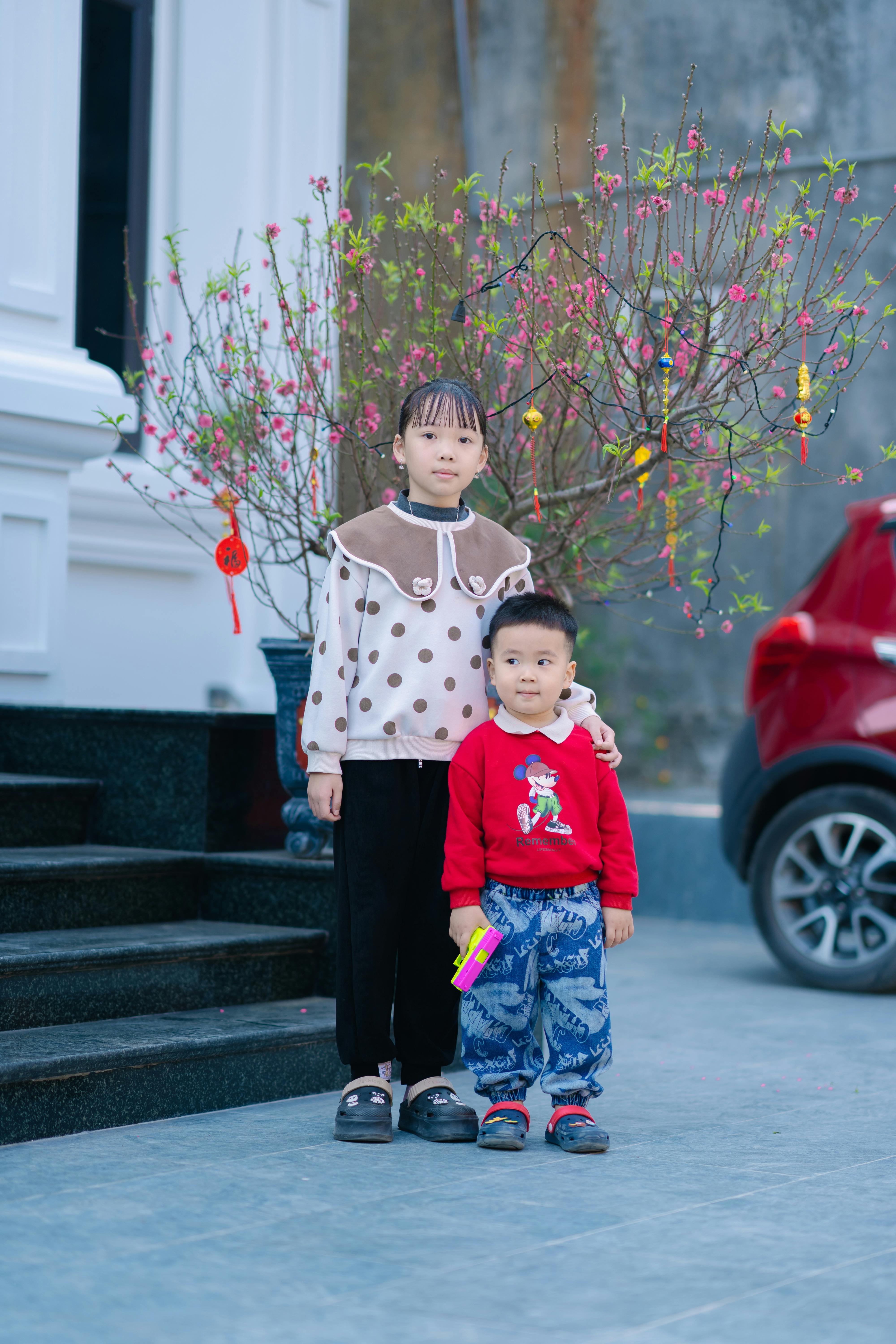 Girl and Boy Standing Together · Free Stock Photo
