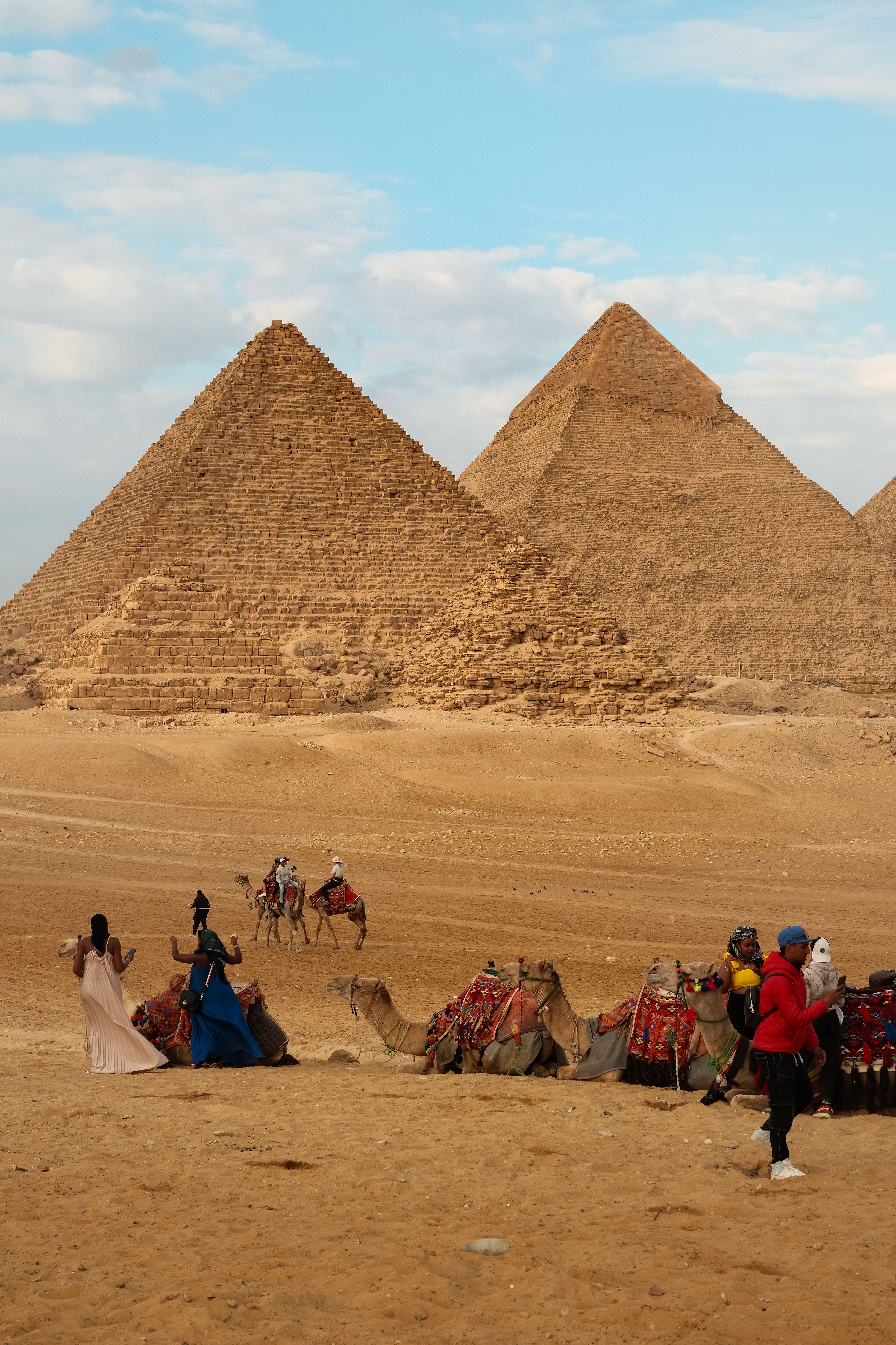 People with Camels near Pyramids in Giza · Free Stock Photo
