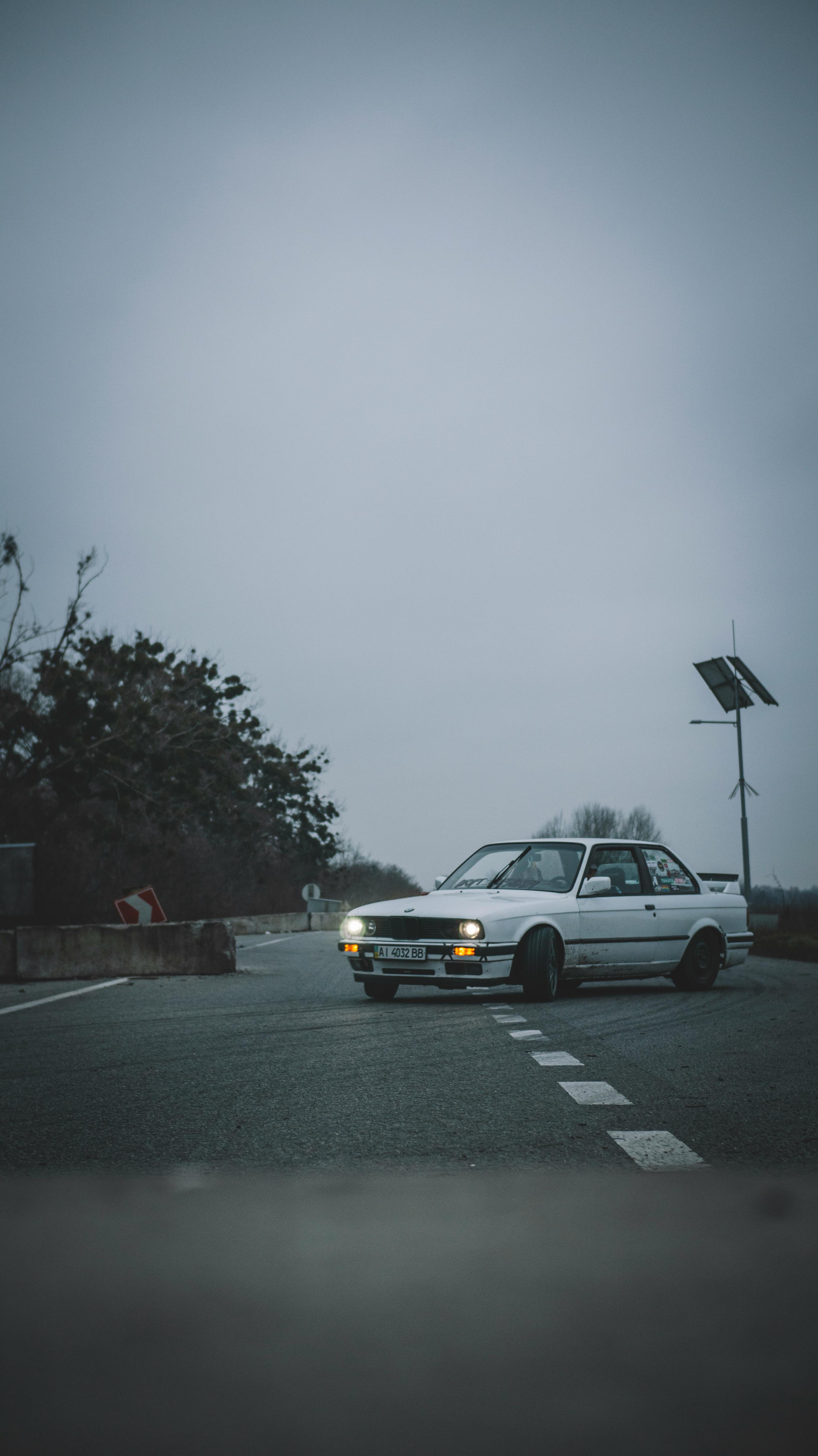 Vintage BMW E30 on Road · Free Stock Photo