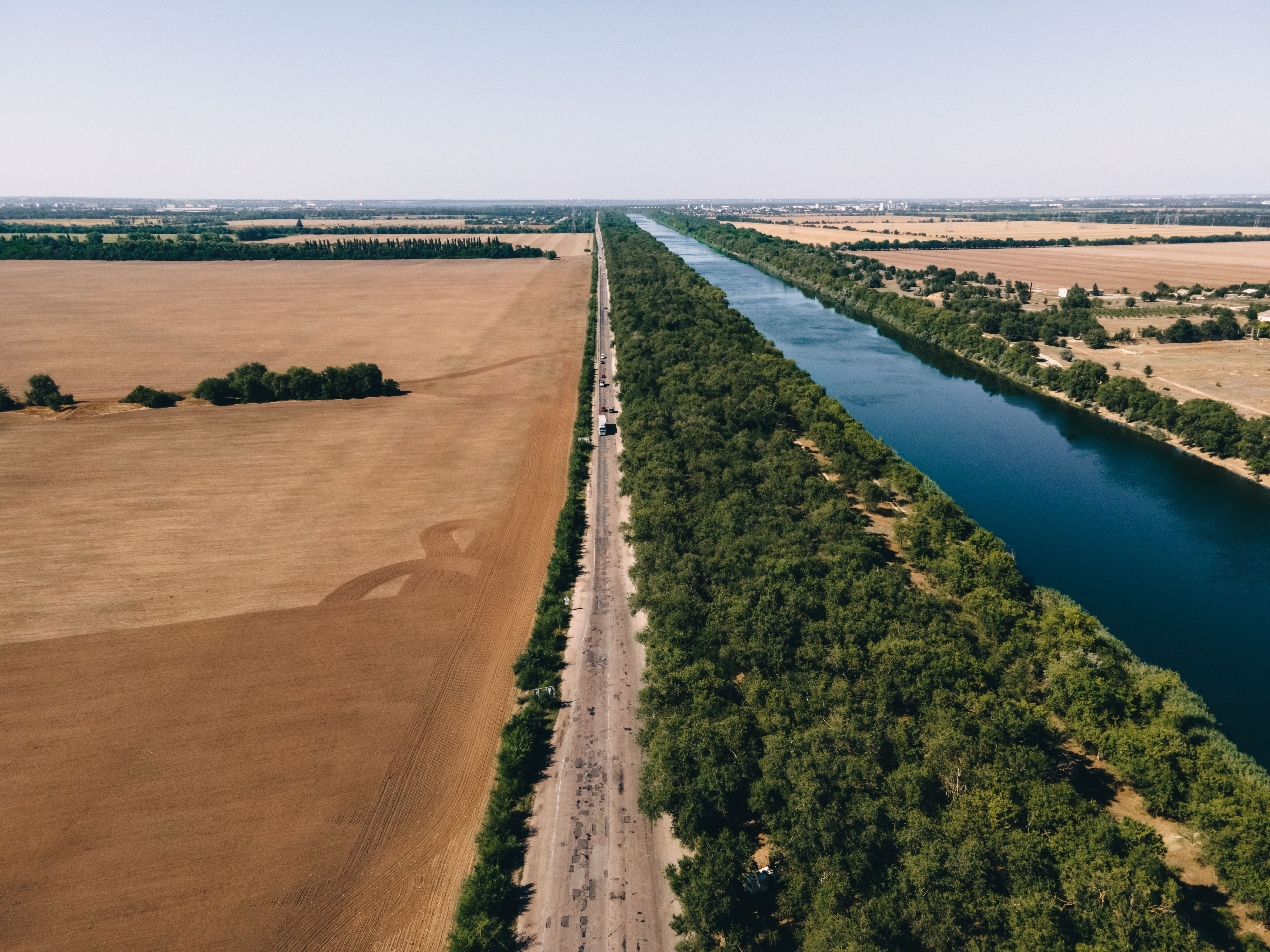 River and Road on Plains in Countryside · Free Stock Photo
