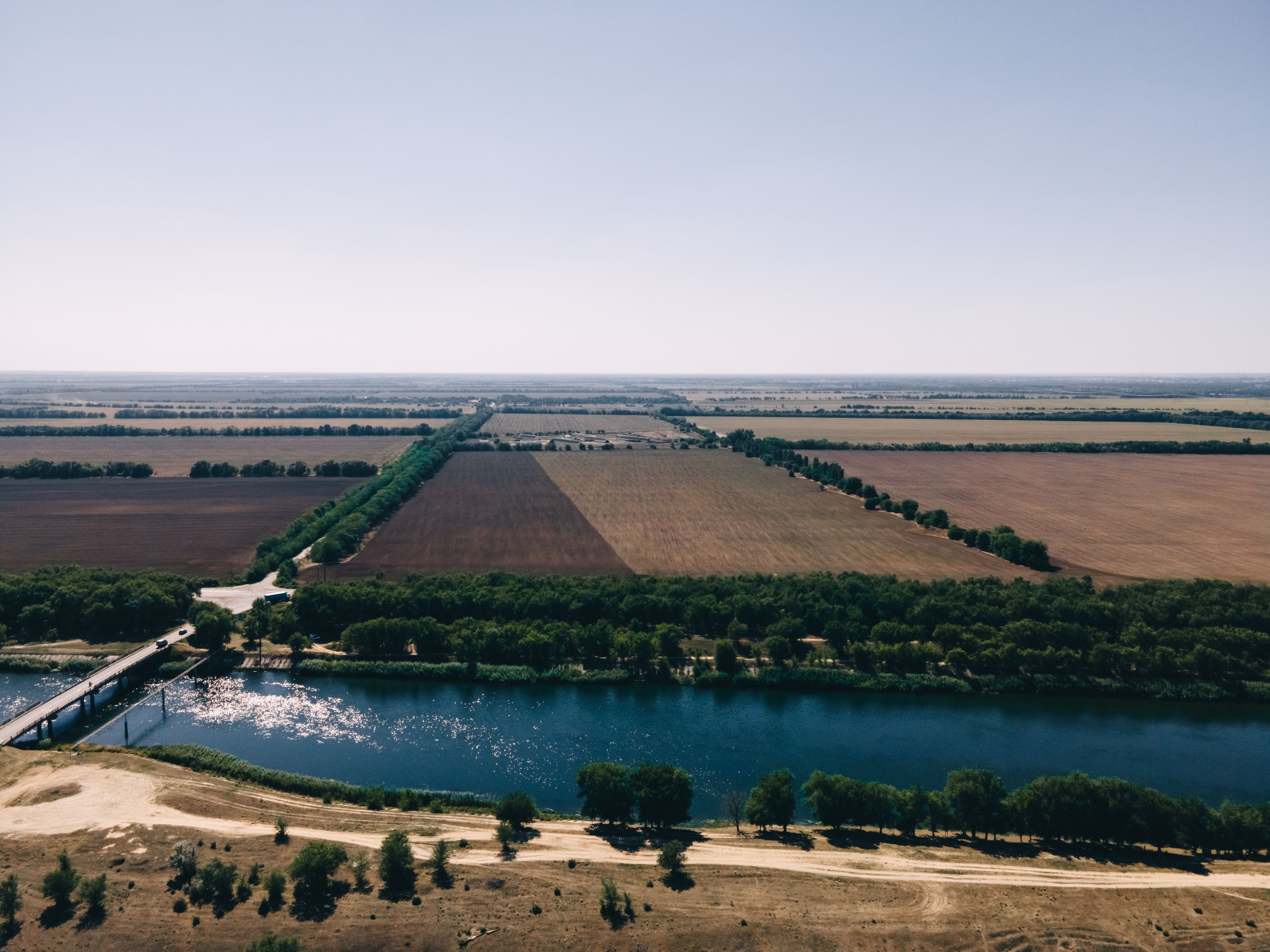 Fields next to a River · Free Stock Photo