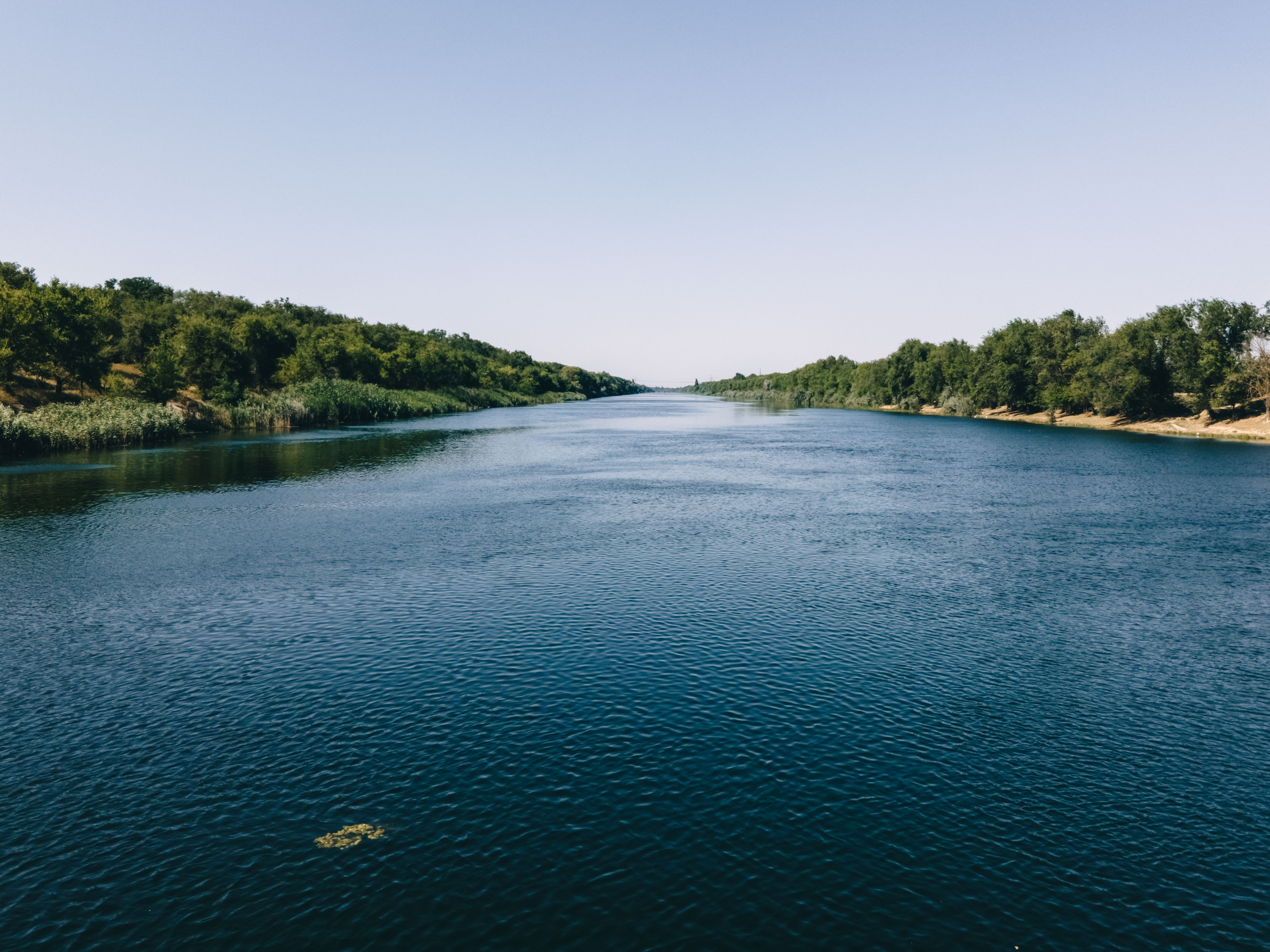 Calm River under Clear Sky · Free Stock Photo