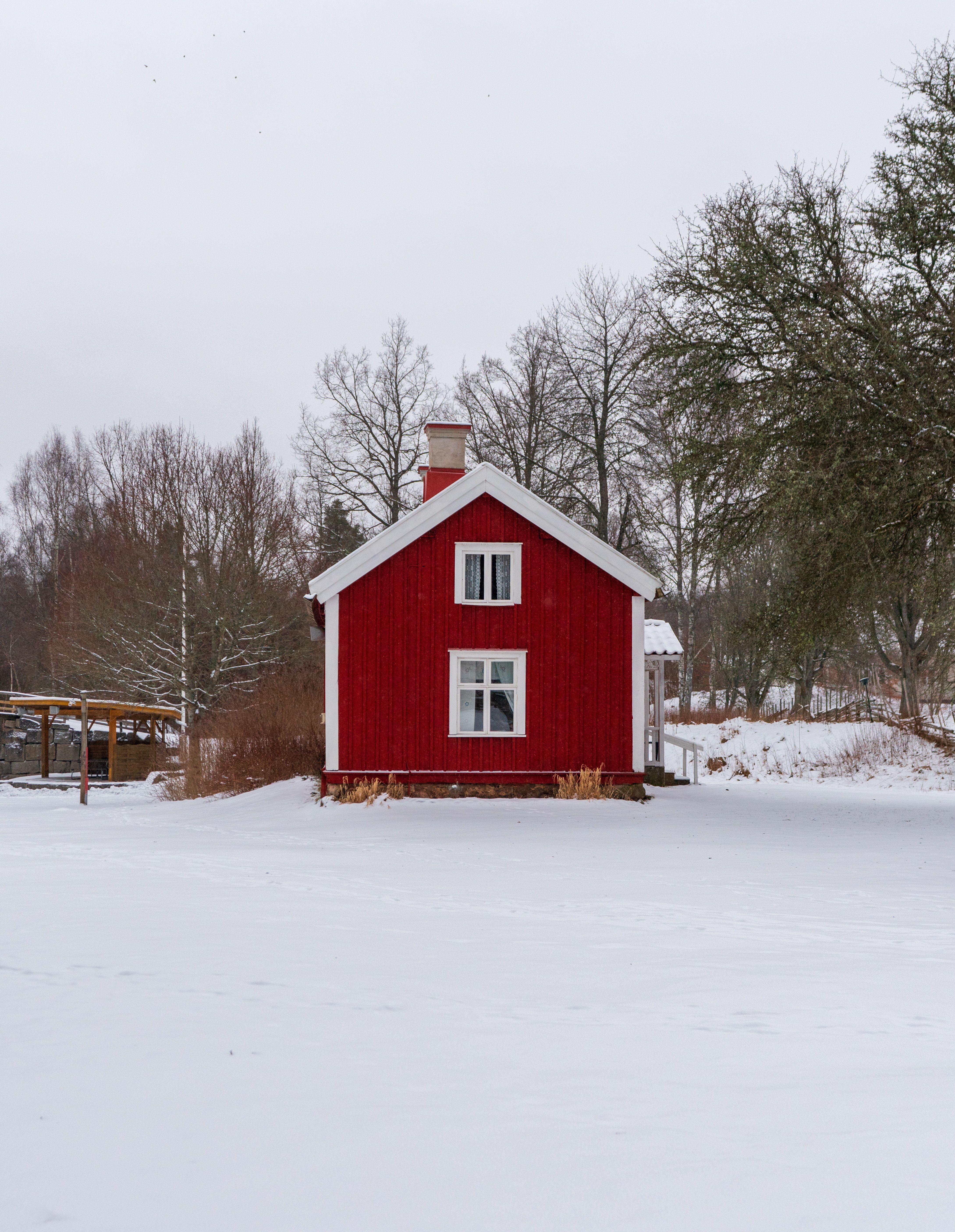 Red Country House Near the Forest in Winter · Free Stock Photo