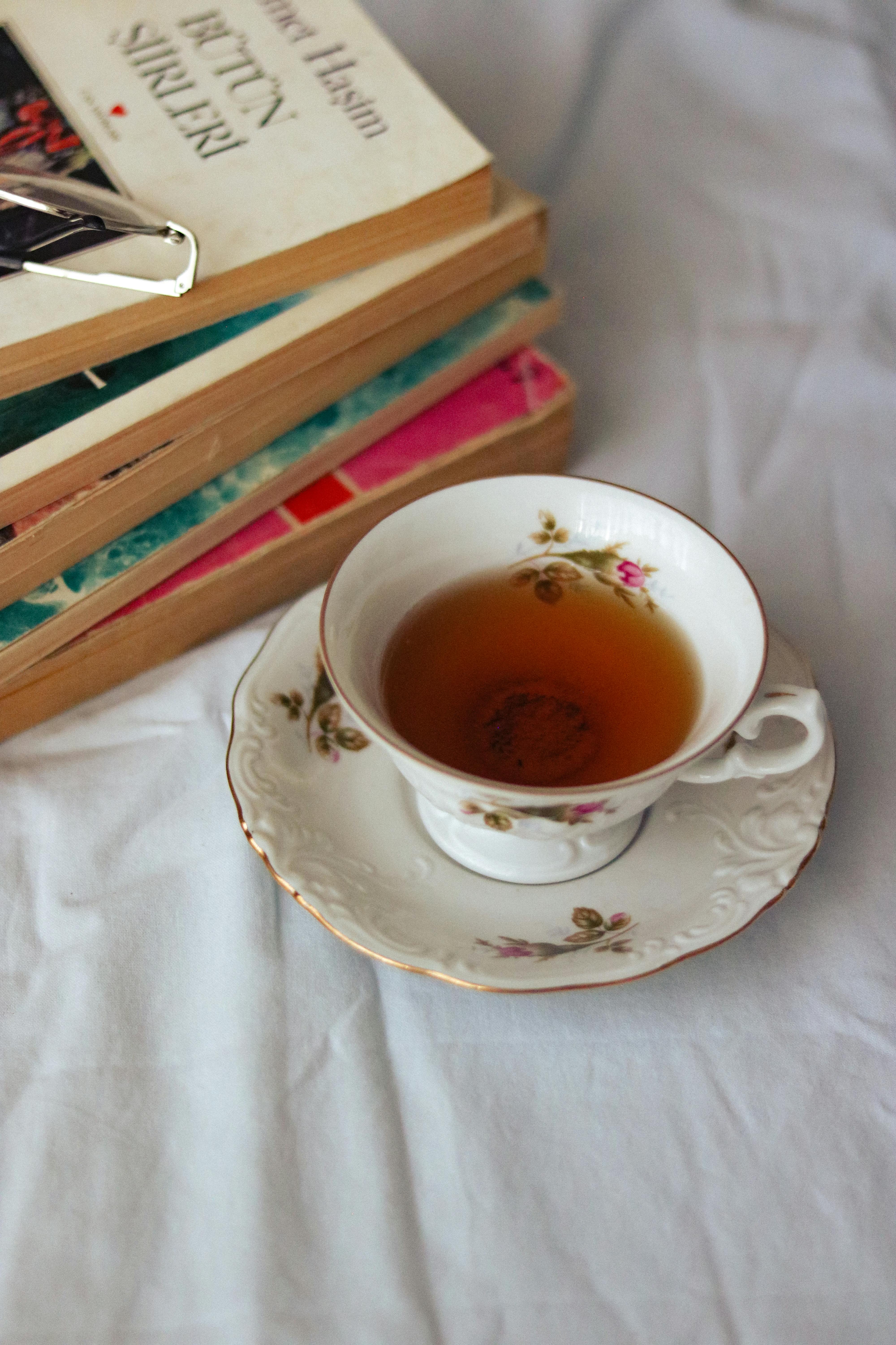 Photo of Teacup On Top Of Books · Free Stock Photo
