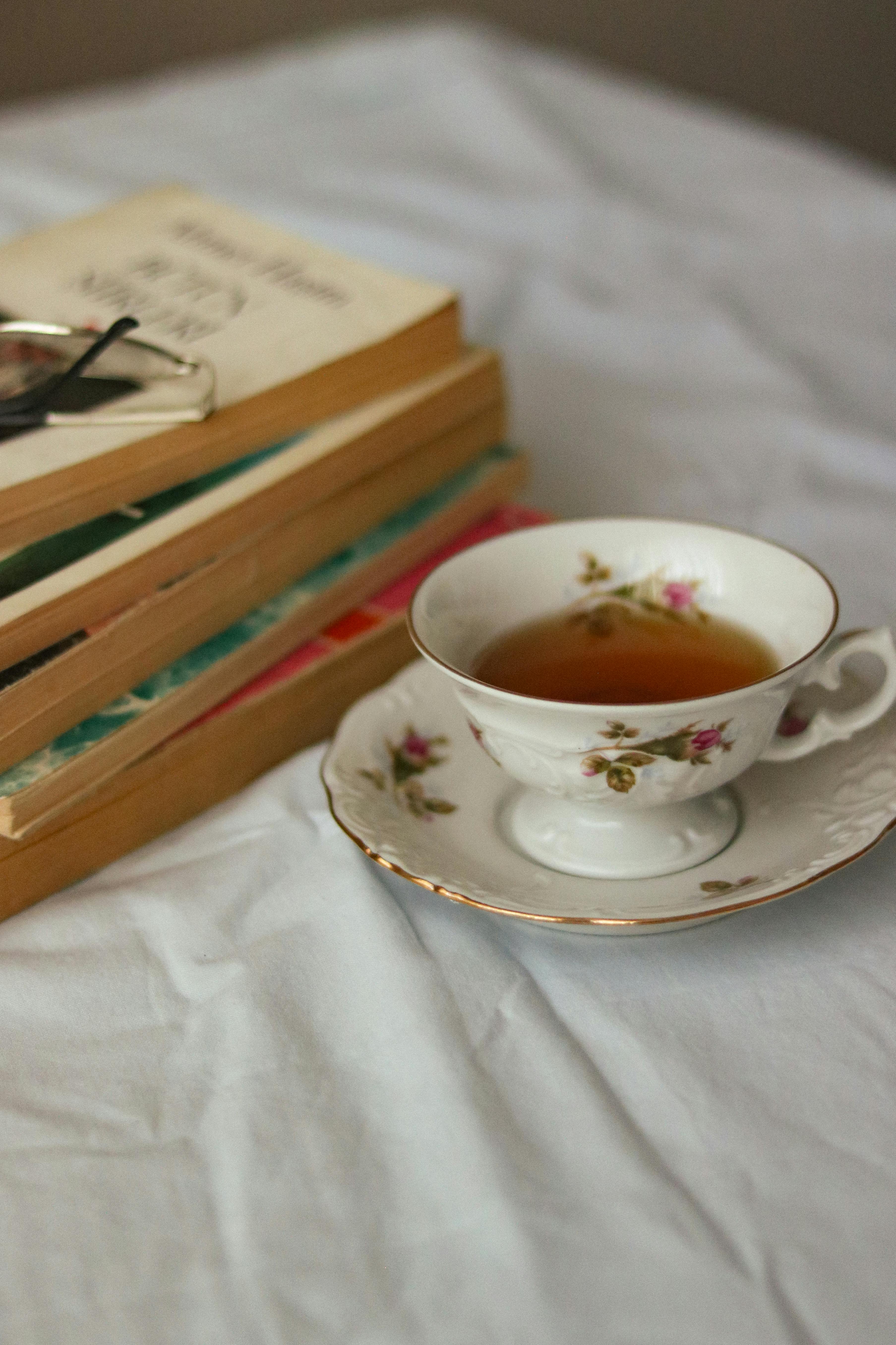 Photo of Teacup On Top Of Books · Free Stock Photo