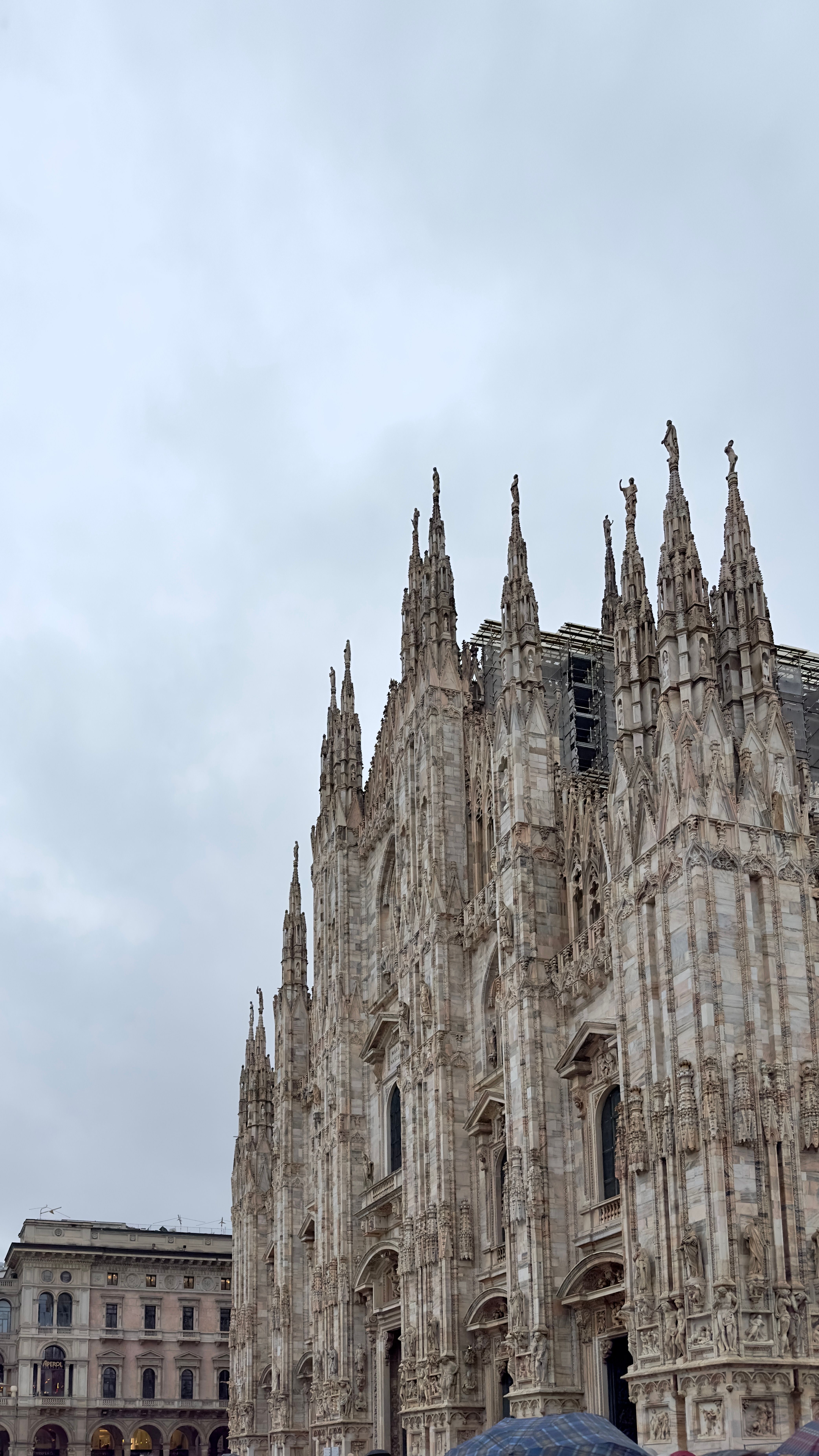 View of the Milan Cathedral under a Cloudy Sky, Milan, Lombardy, Italy ...