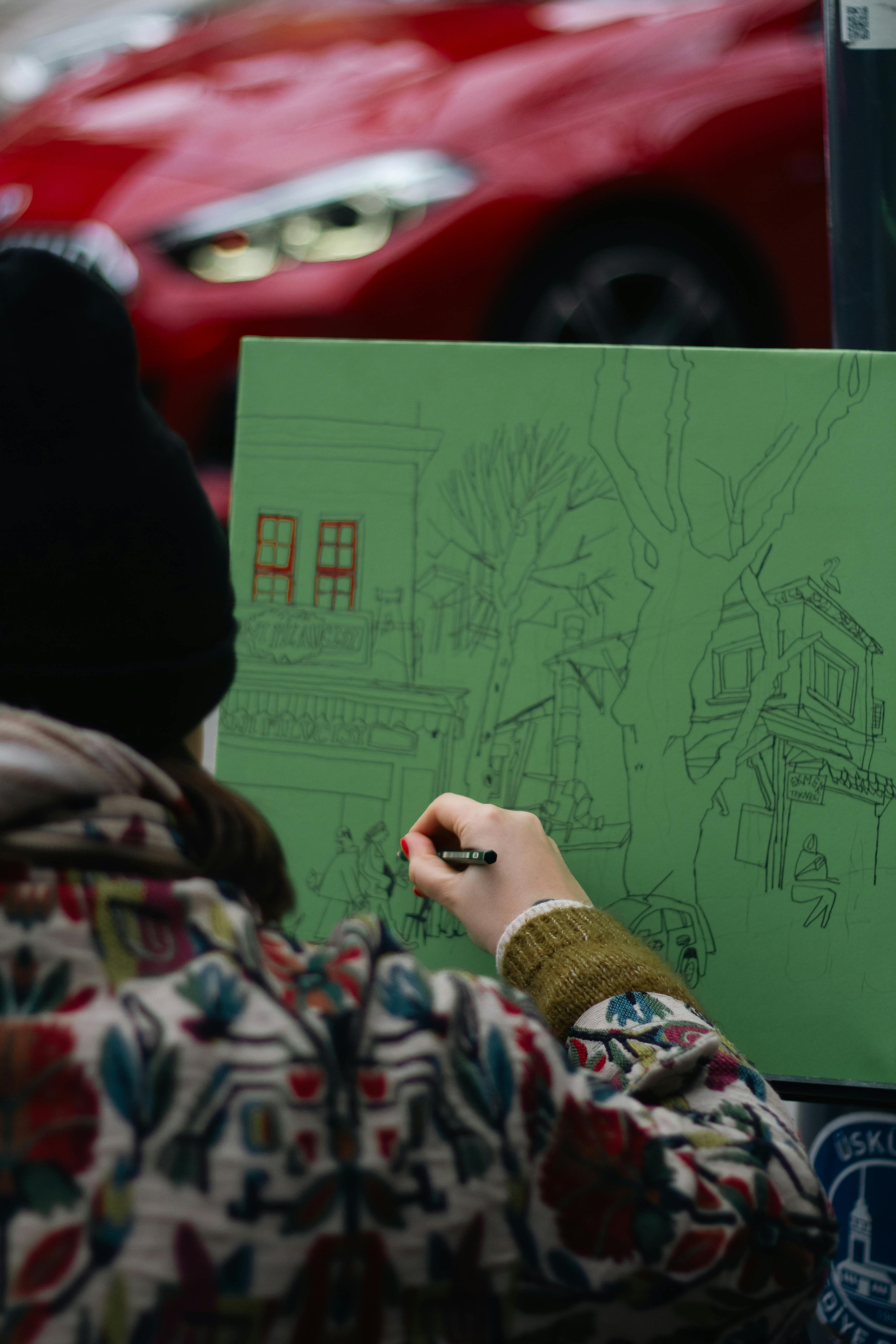 Back View of Artist Drawing on Green Board · Free Stock Photo