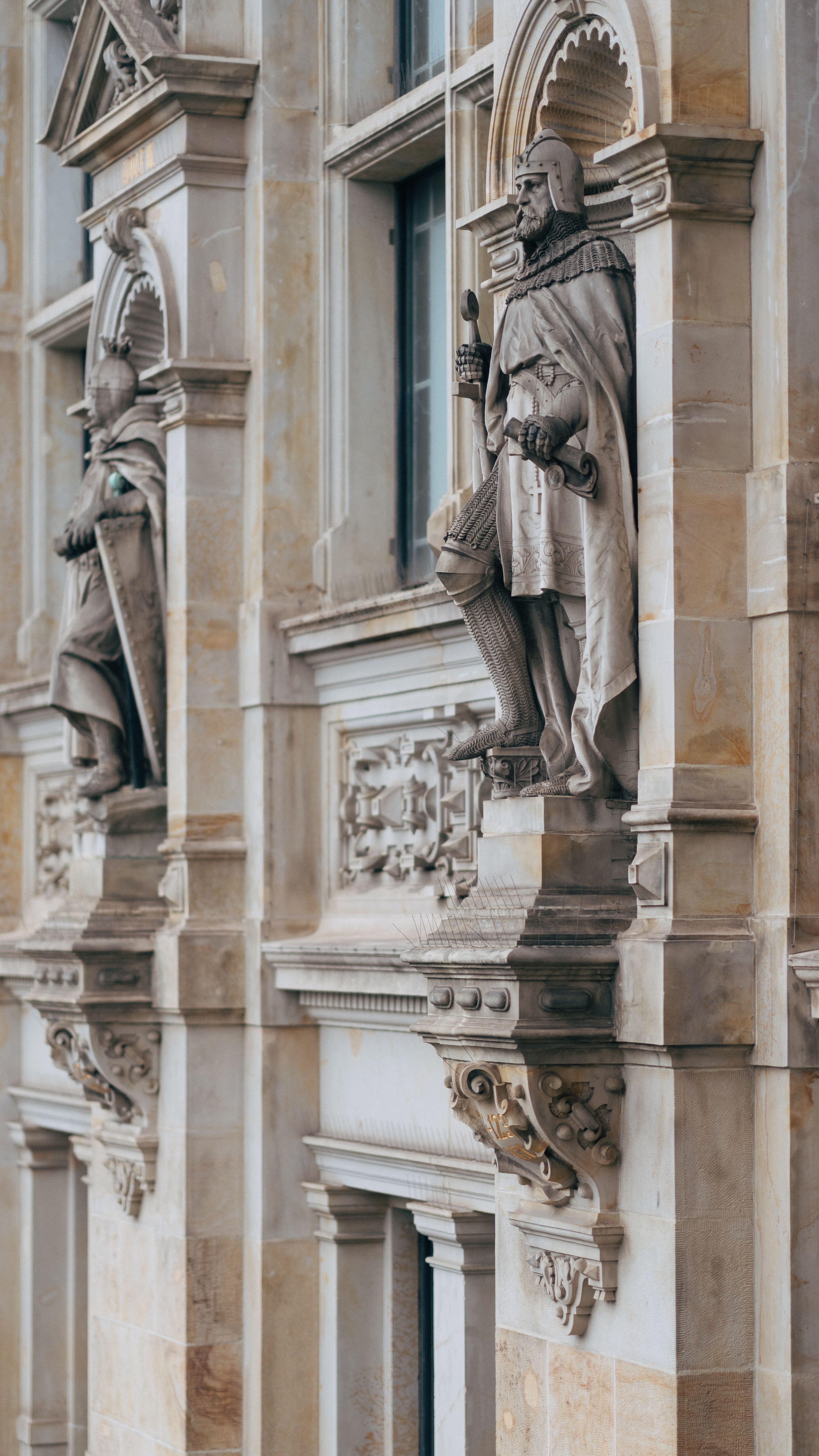 Sculptures of Knights Decorating the Facade of a Historic Building ...