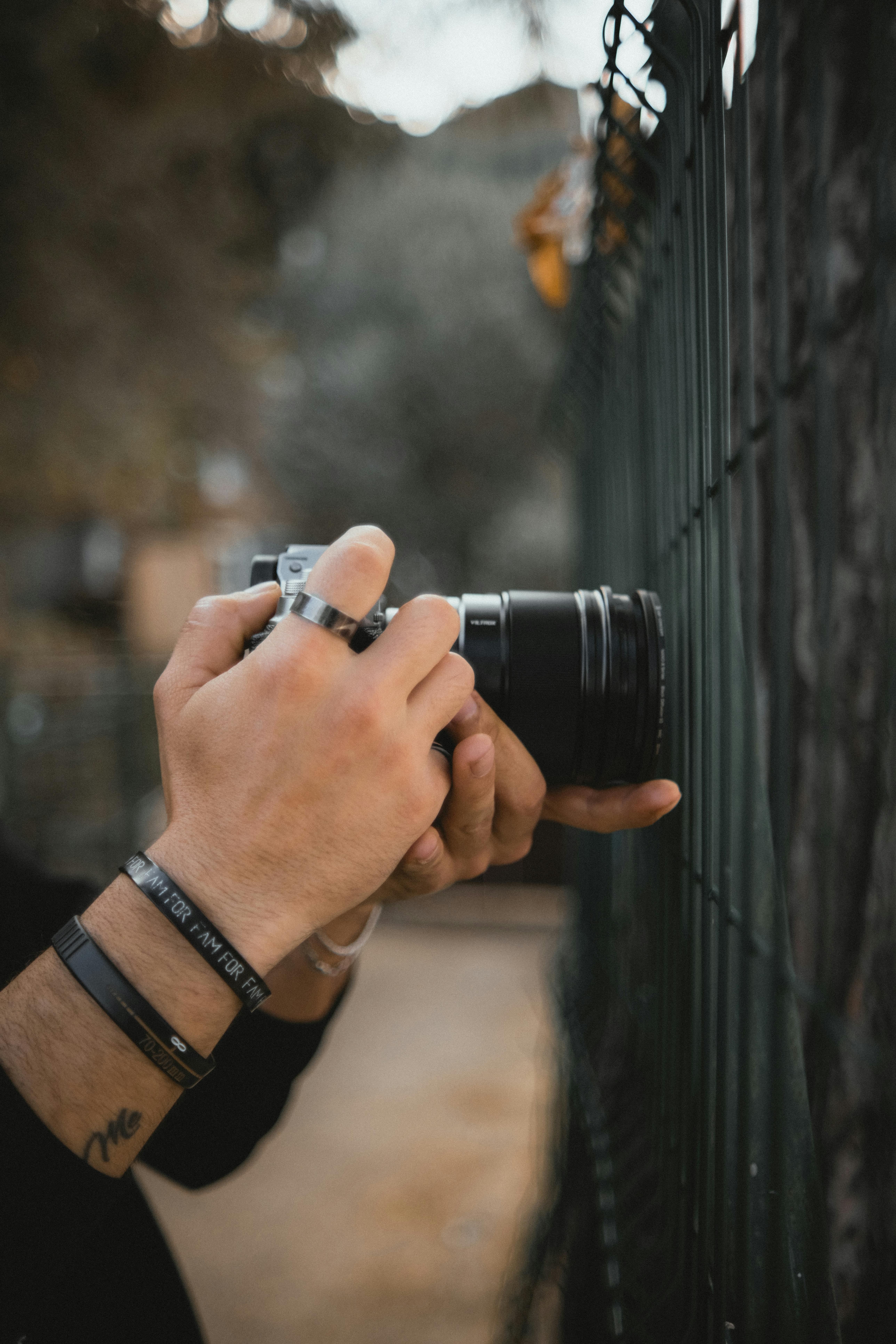 Person Holding Black Dslr Camera · Free Stock Photo