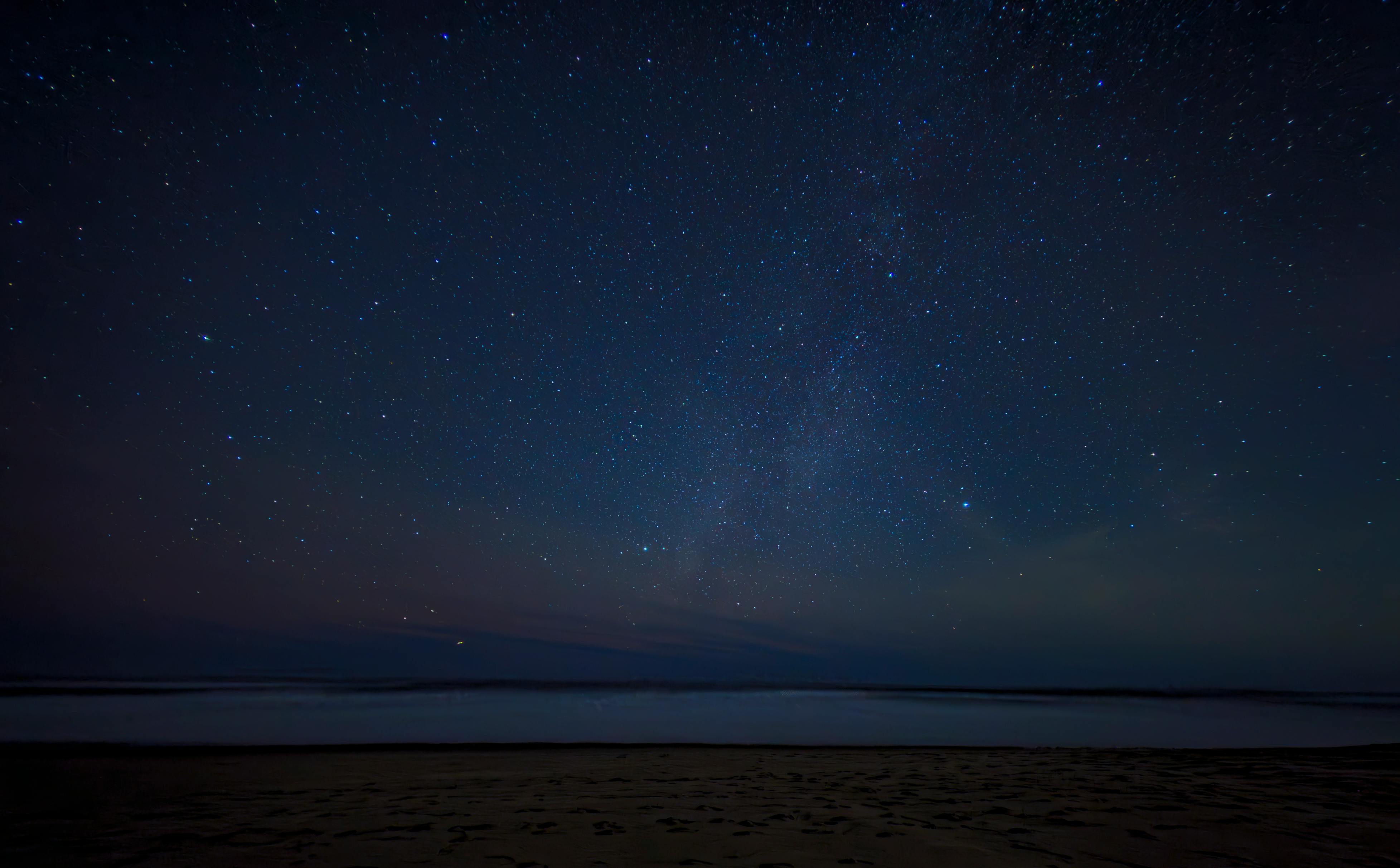 Stars on Night Sky over Sea Coast · Free Stock Photo