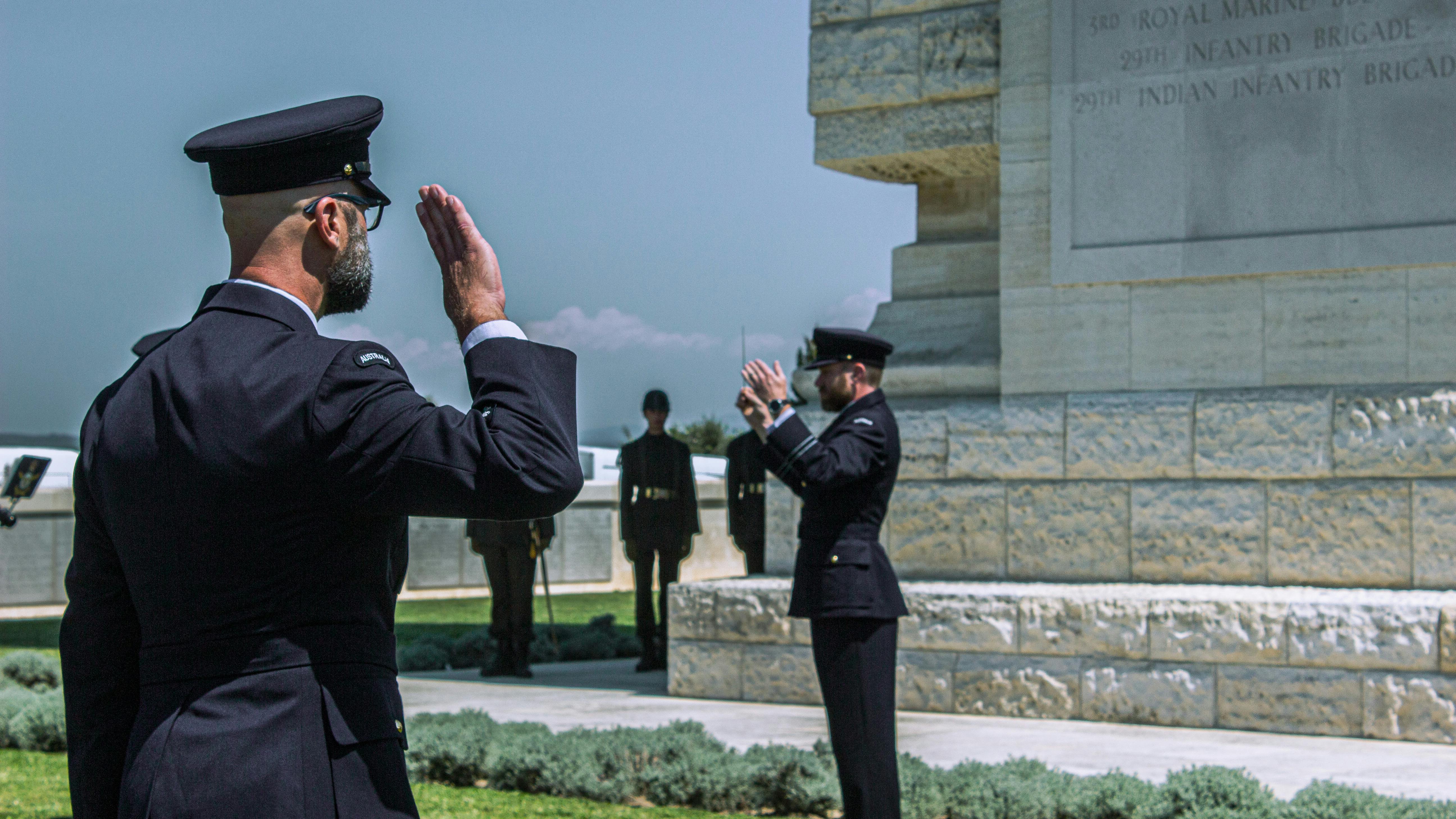 Soldiers in Official Military Uniforms Standing and Saluting around a ...