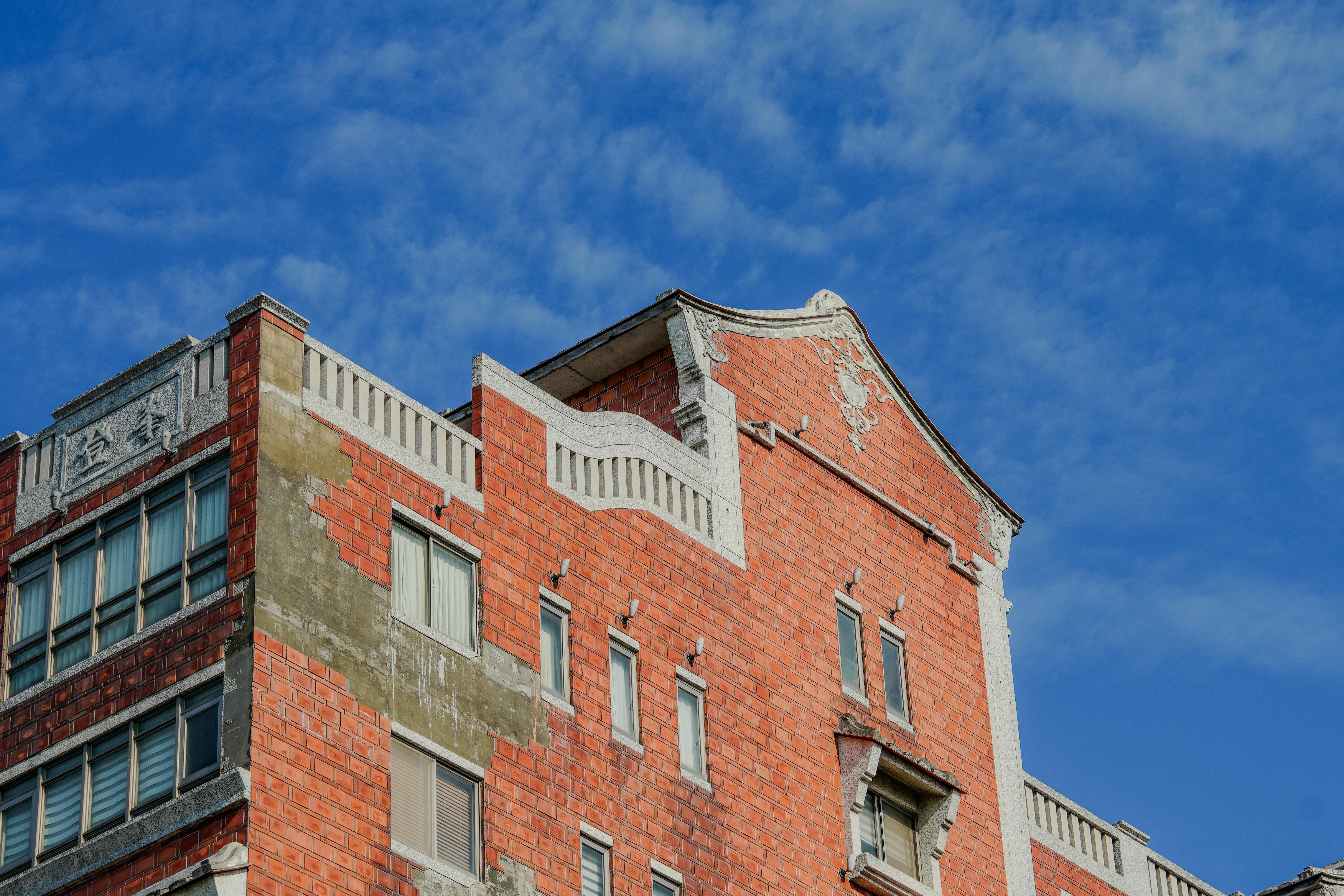 Facade of Brick Asian Building · Free Stock Photo