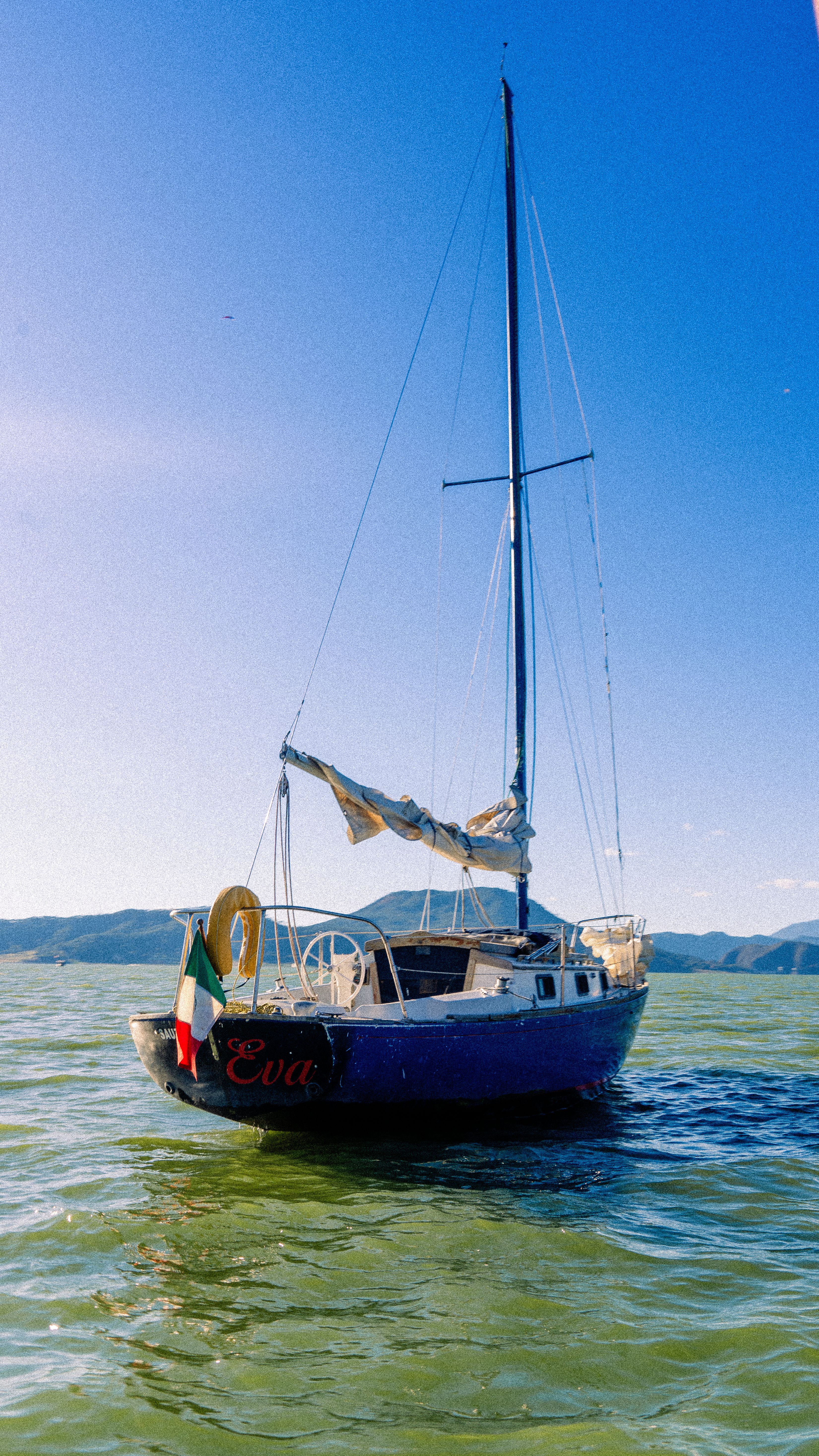 Sailboat on Sea Coast · Free Stock Photo
