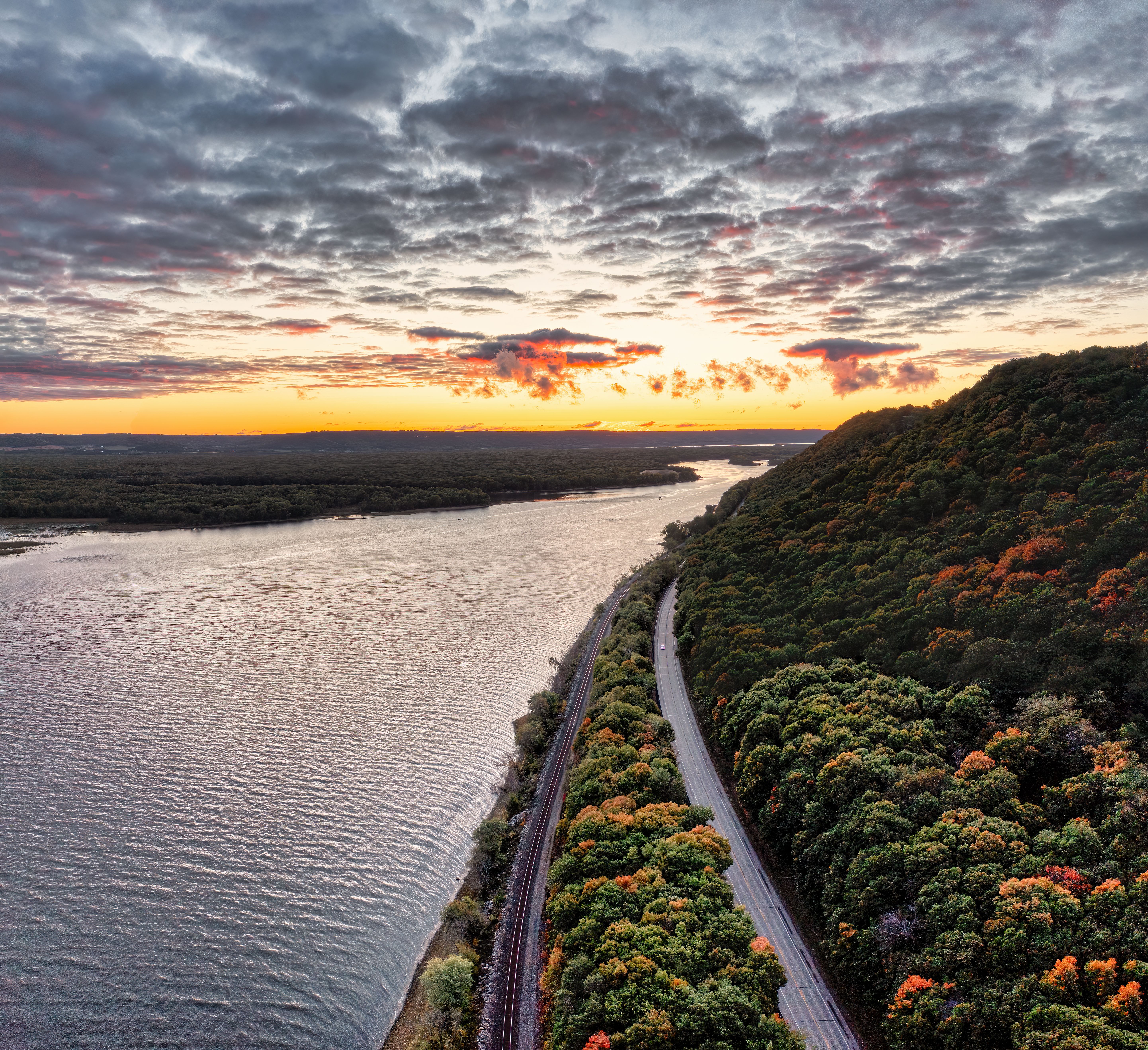 Autumn Forest around Road by River at Sunset · Free Stock Photo