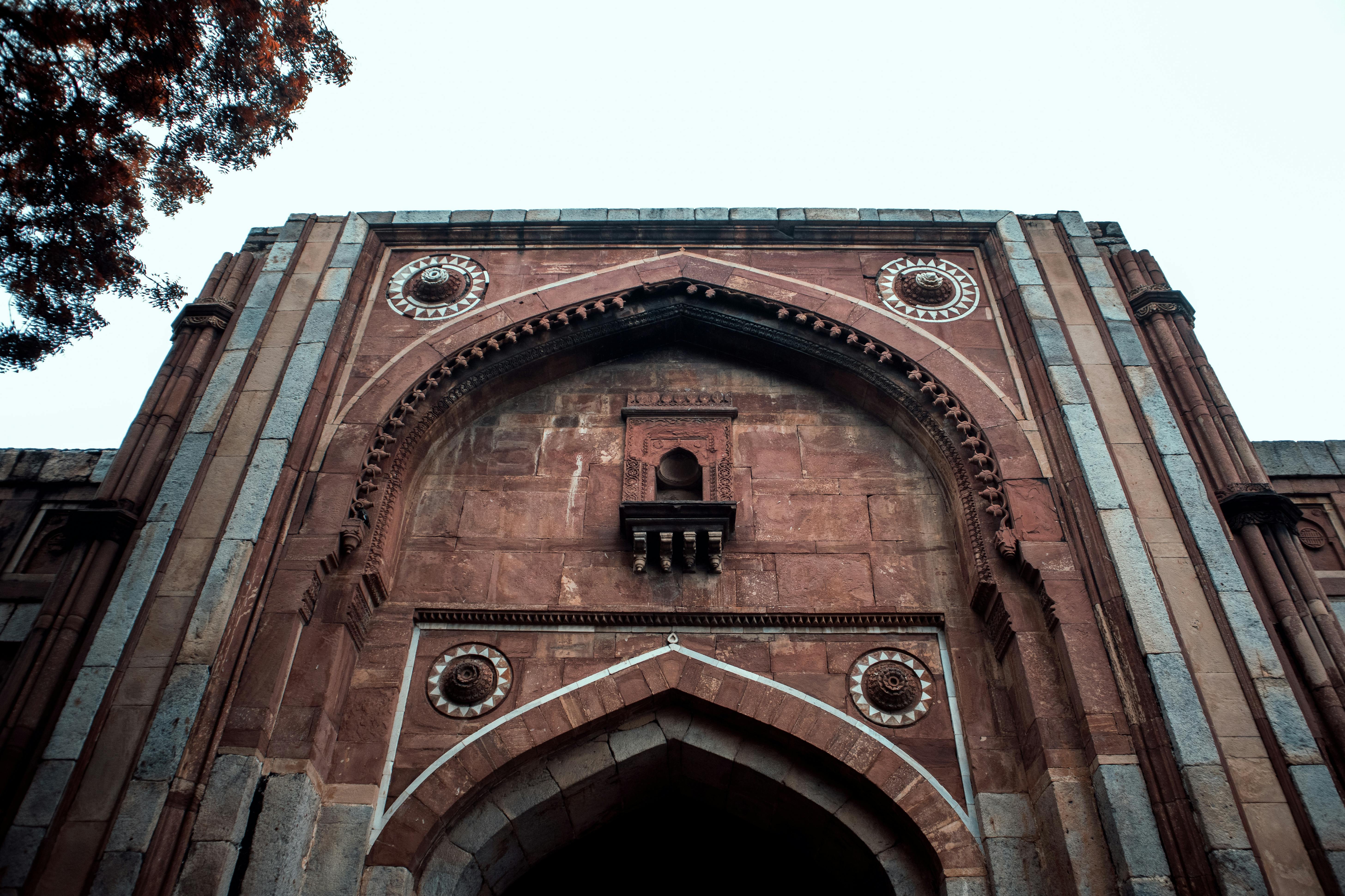 Low Angle Shot of the Facade of the Jamali Kamali Mosque and Tomb in ...