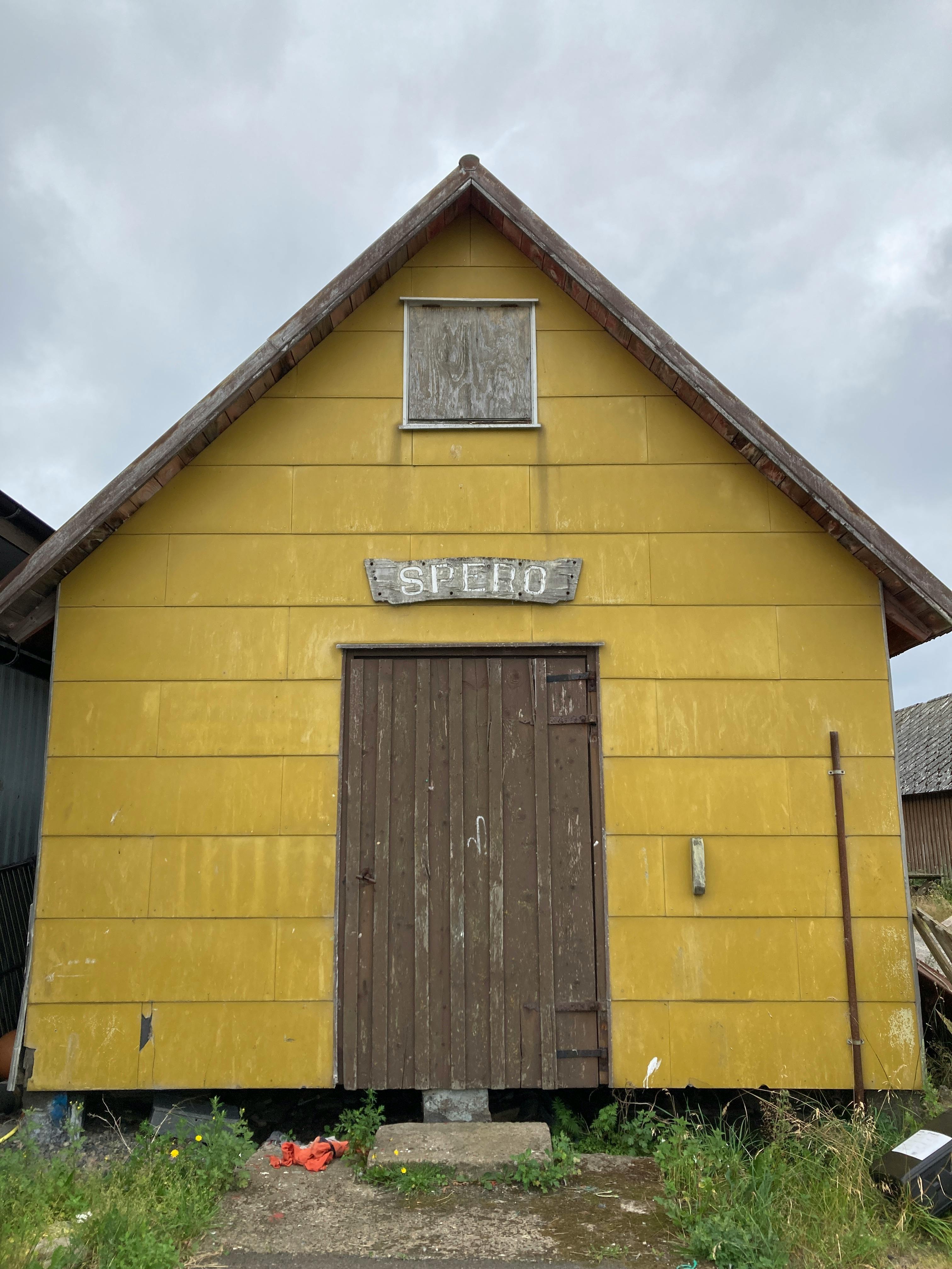 Facade of a Yellow Hut · Free Stock Photo