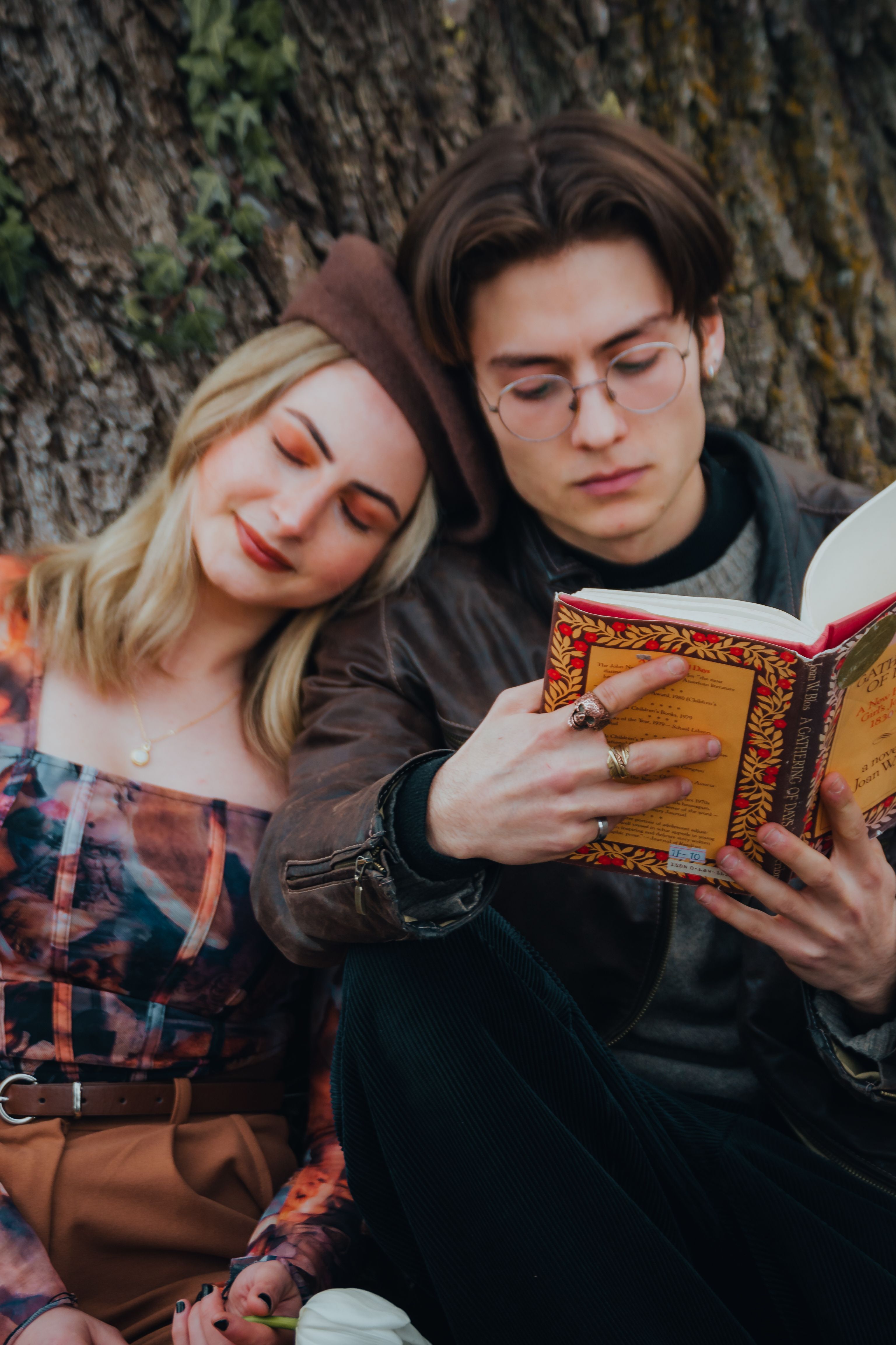 Portrait of Couple with Book · Free Stock Photo