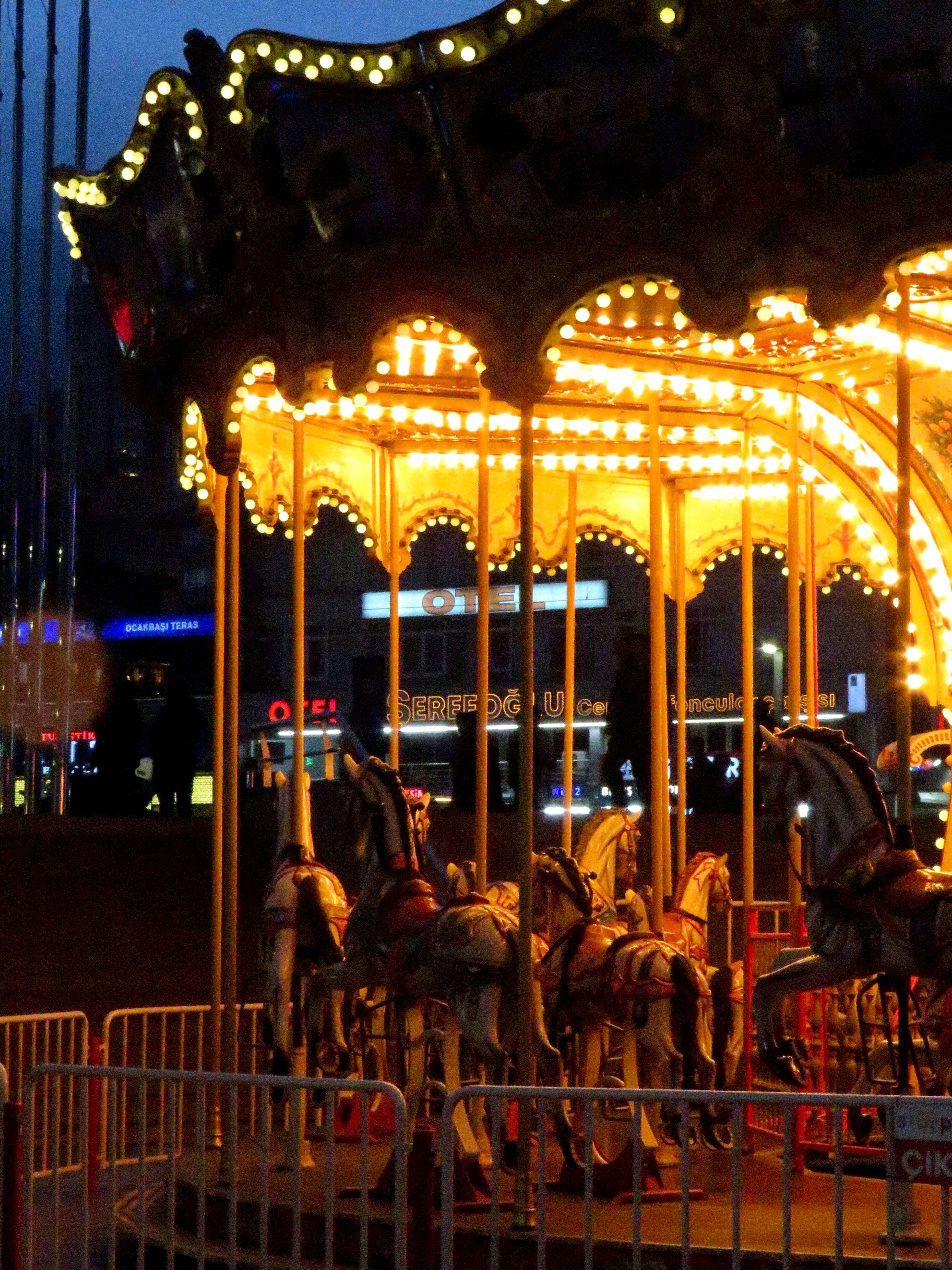 Photo of an Illuminated Carousel in City at Night · Free Stock Photo