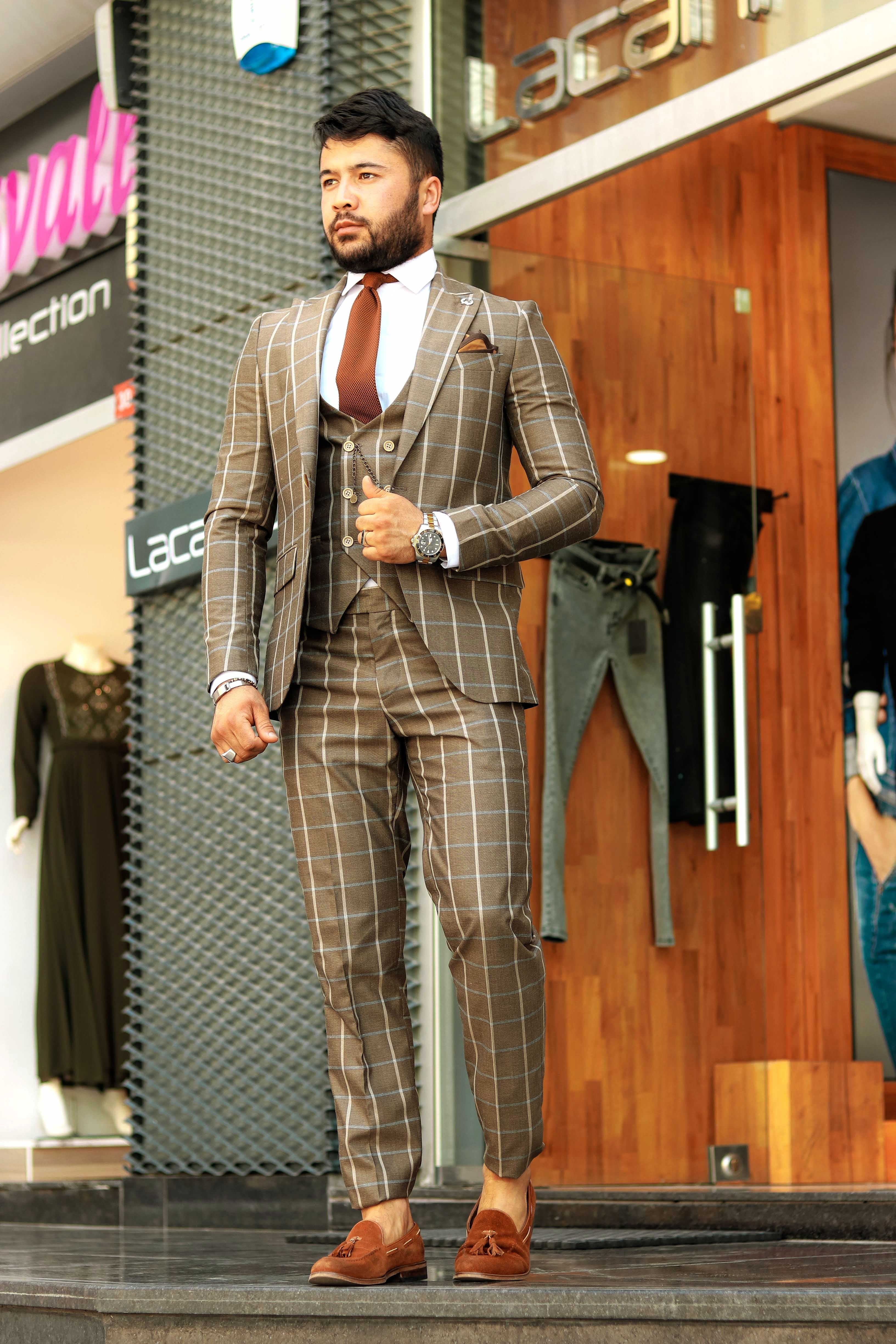 Model in Brown Suit with Tie · Free Stock Photo