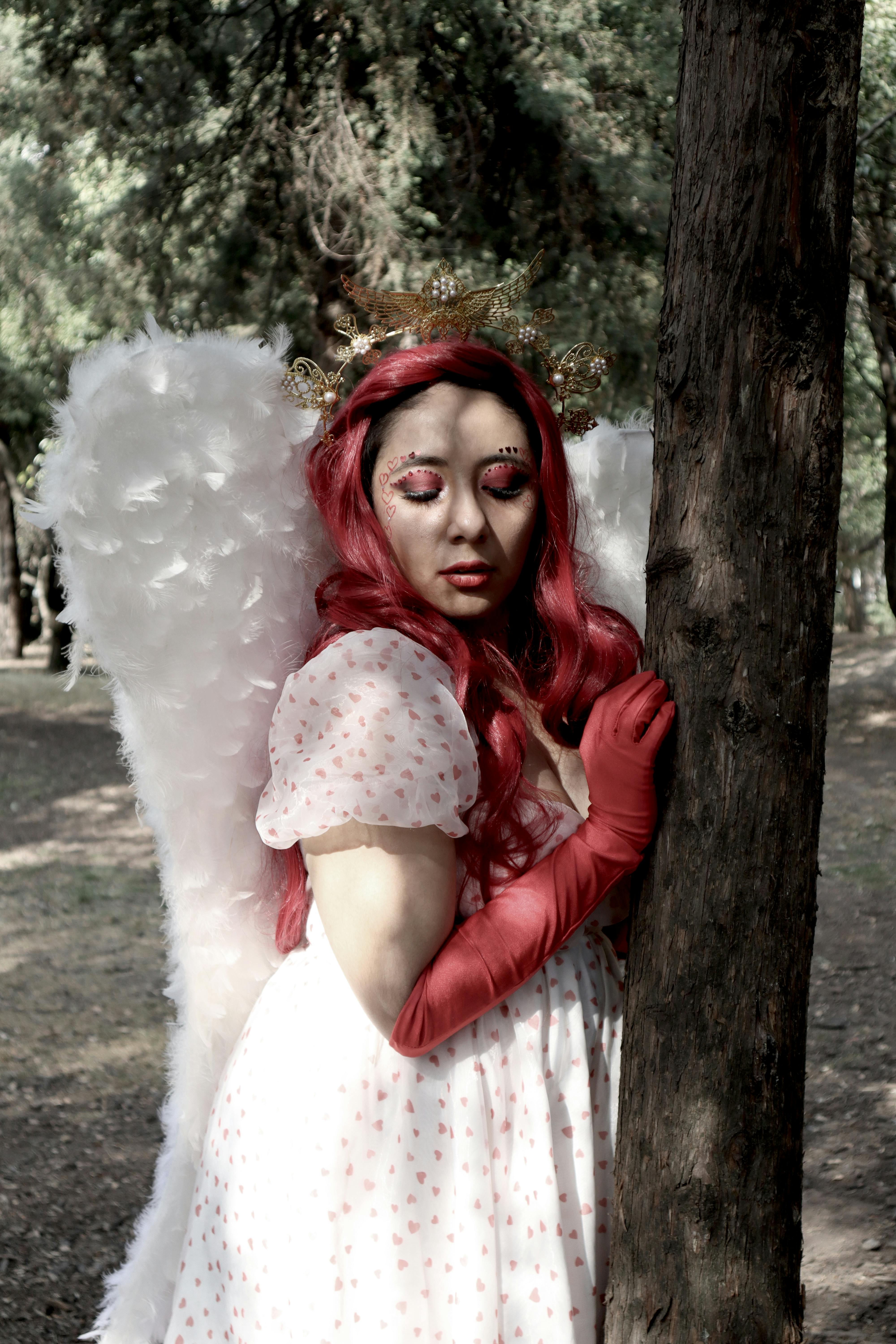 Woman with Red Hair Dressed as Angel · Free Stock Photo