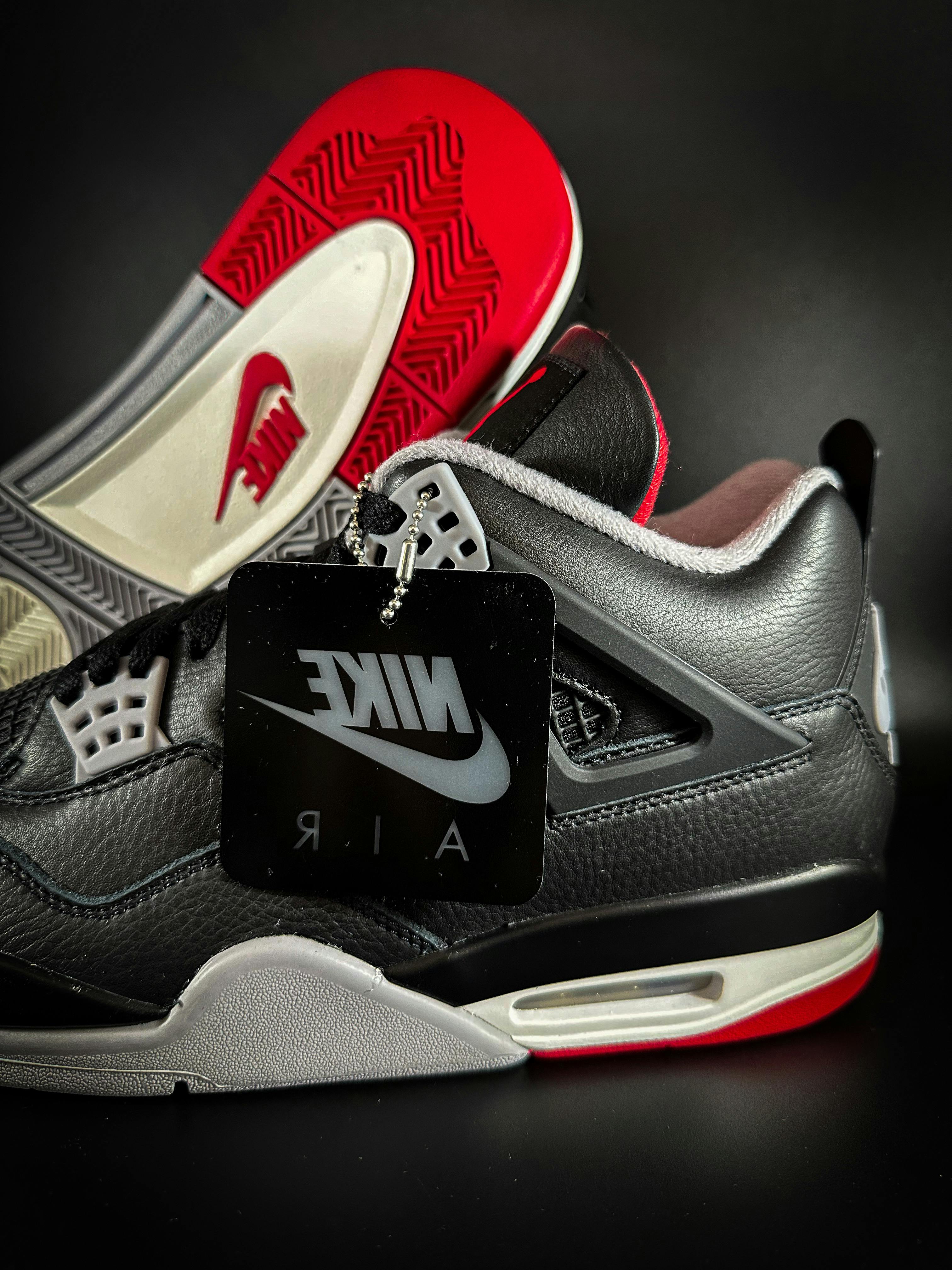 Branded Sneakers on Shelves · Free Stock Photo