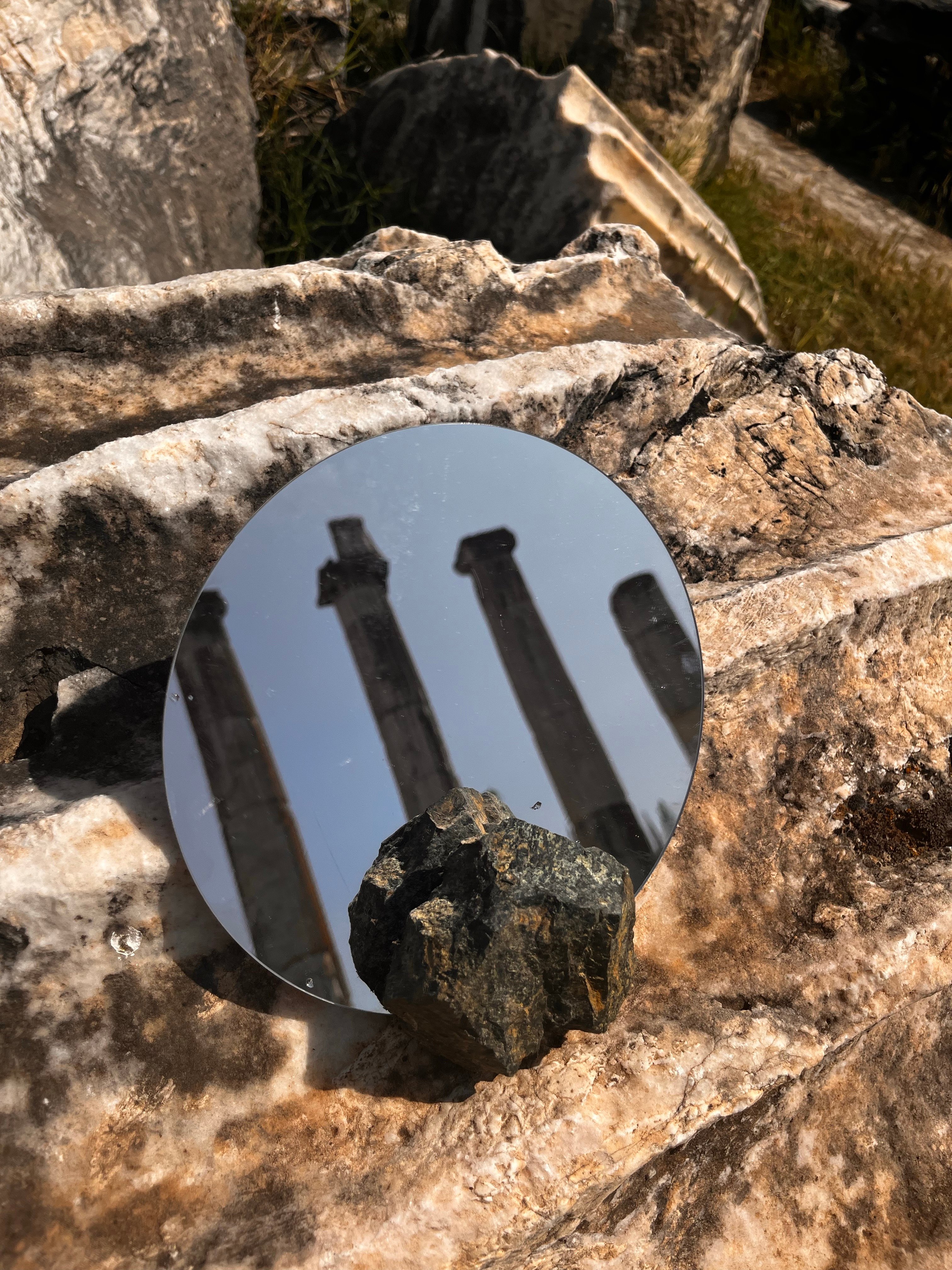 Reflection of Columns in a Mirror · Free Stock Photo