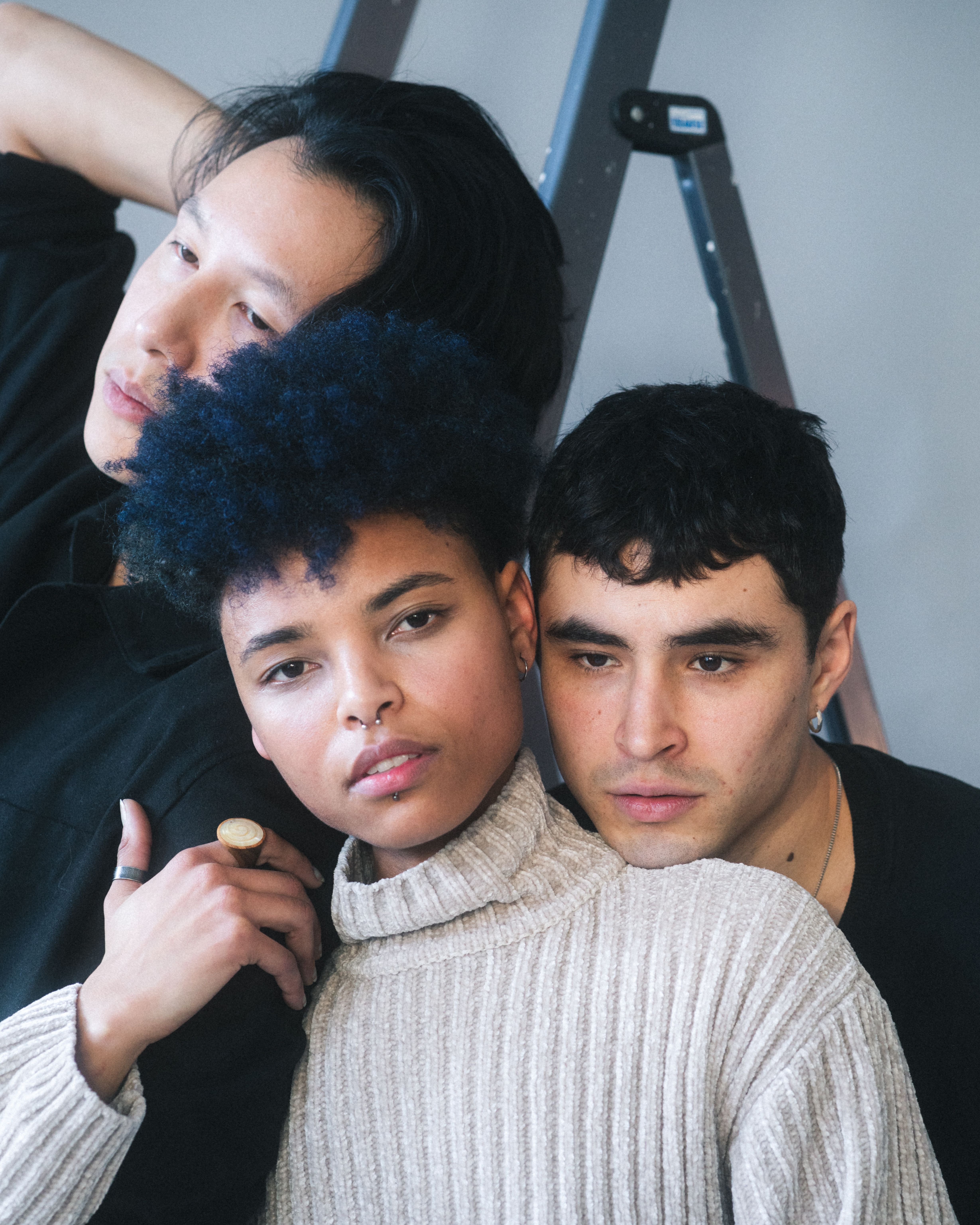 Three Models Posing Together · Free Stock Photo