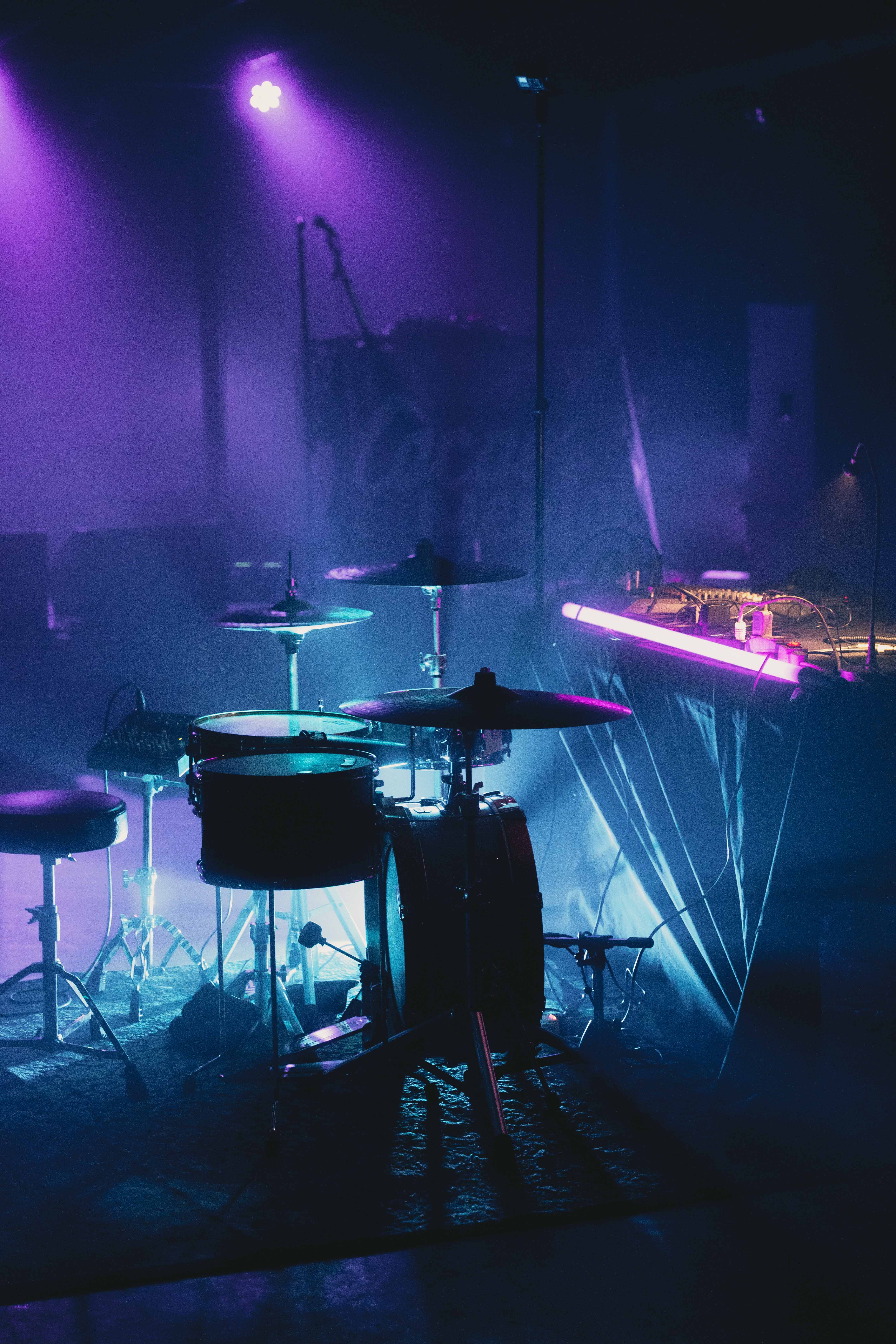 Percussion on Stage in Purple Light · Free Stock Photo