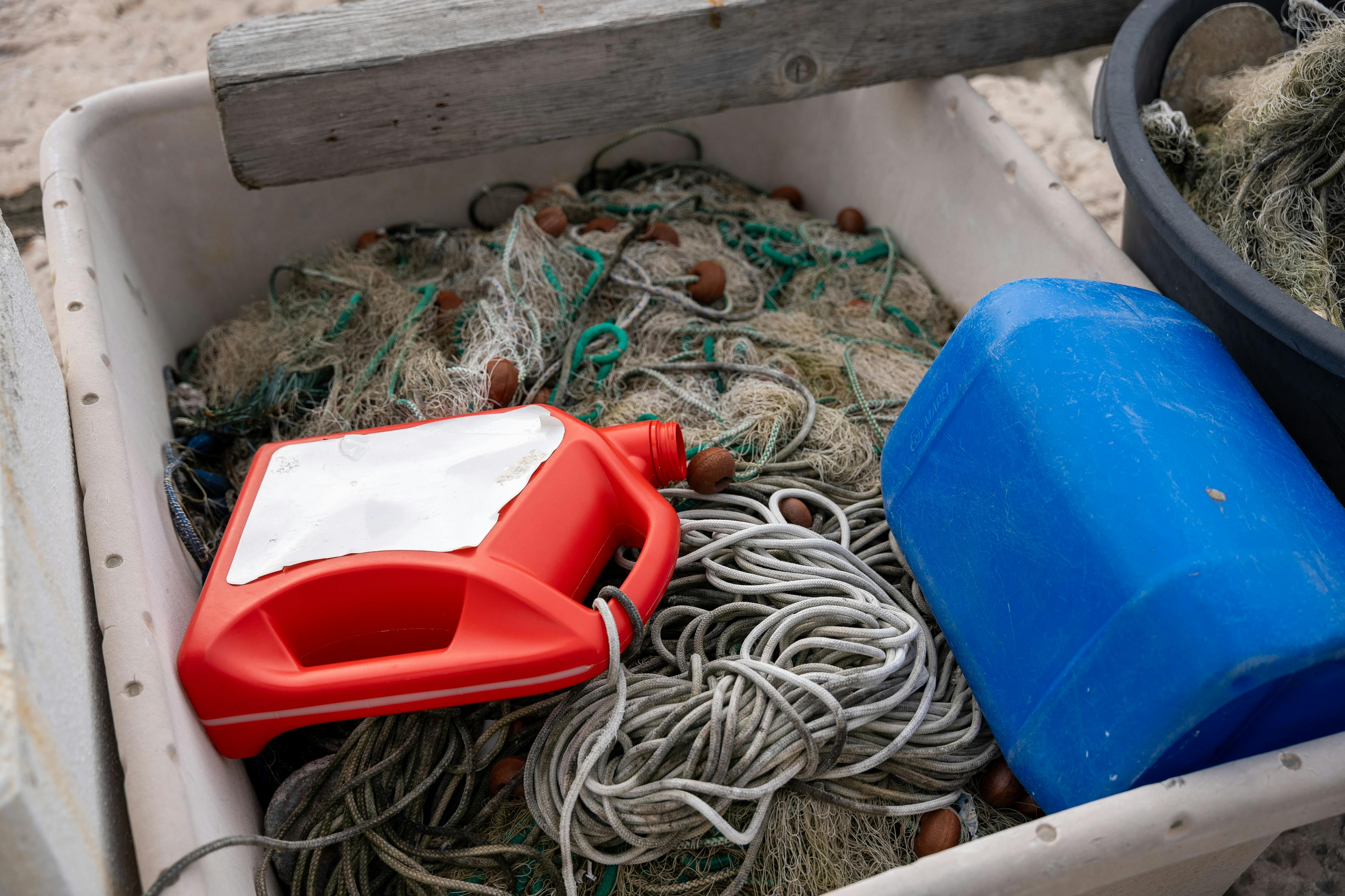 Close-up of a Container with Fishing Equipment · Free Stock Photo