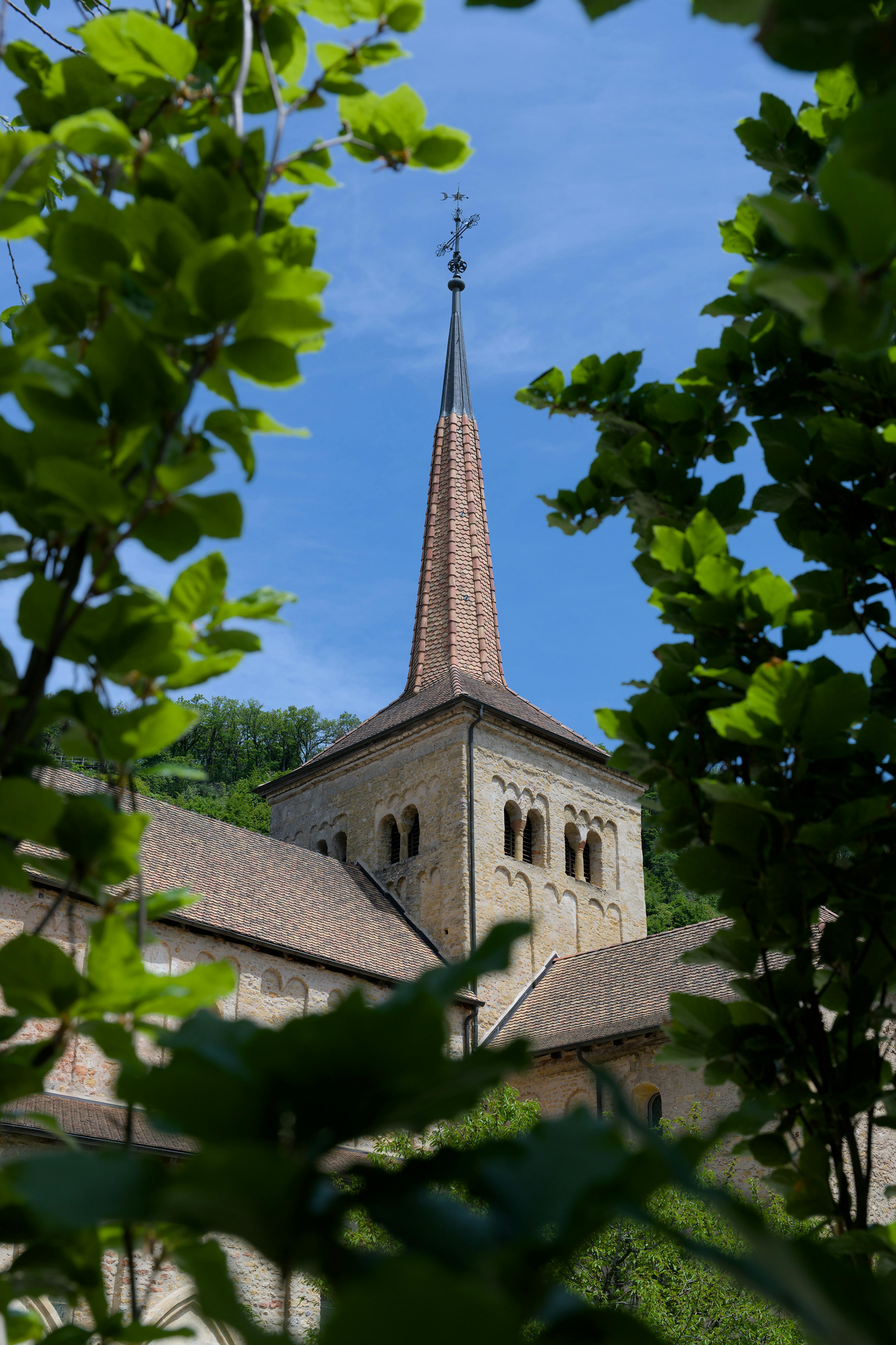 Gothic Church with Tall Roof Spire · Free Stock Photo