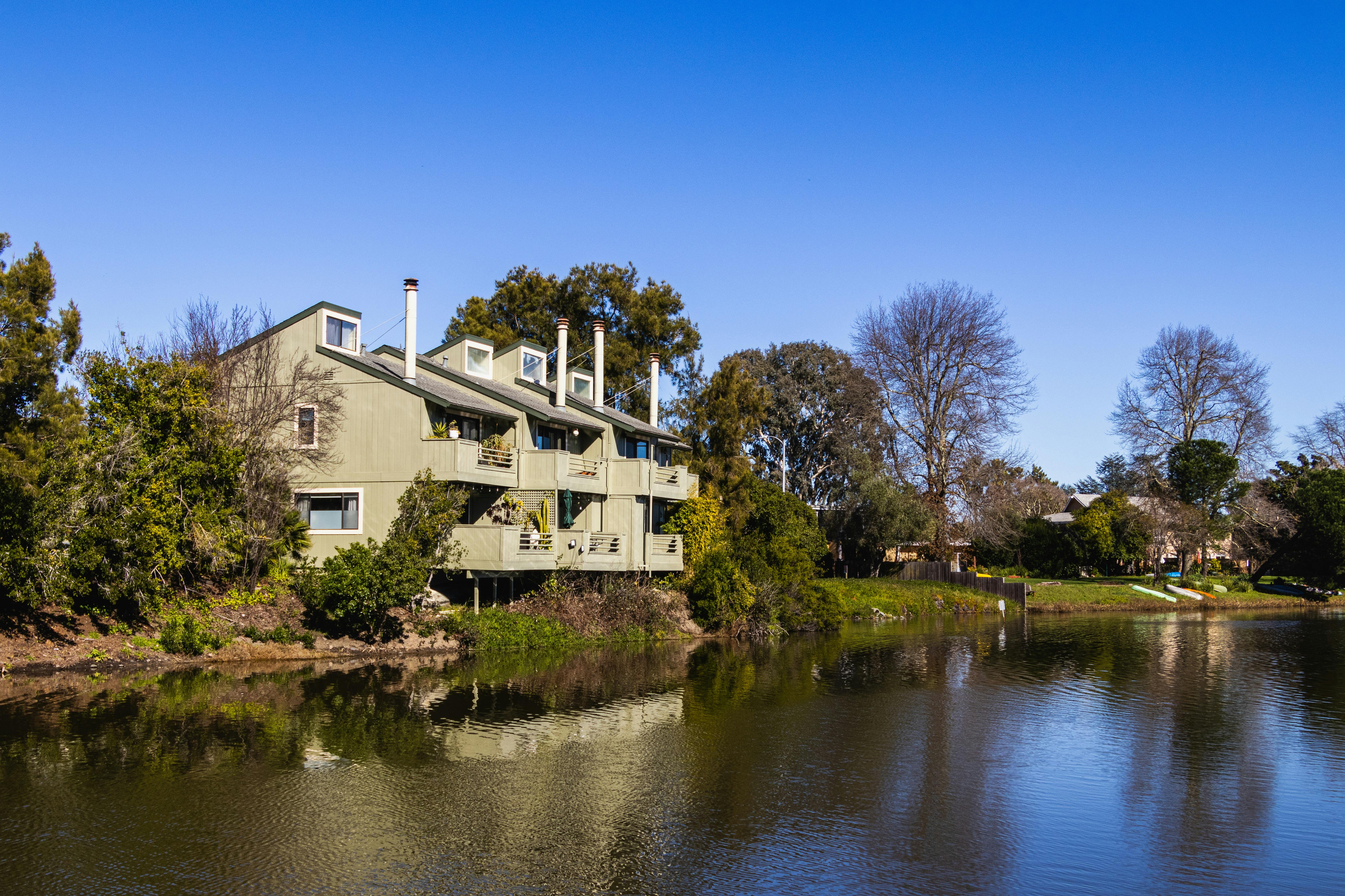 Residential Building over River · Free Stock Photo
