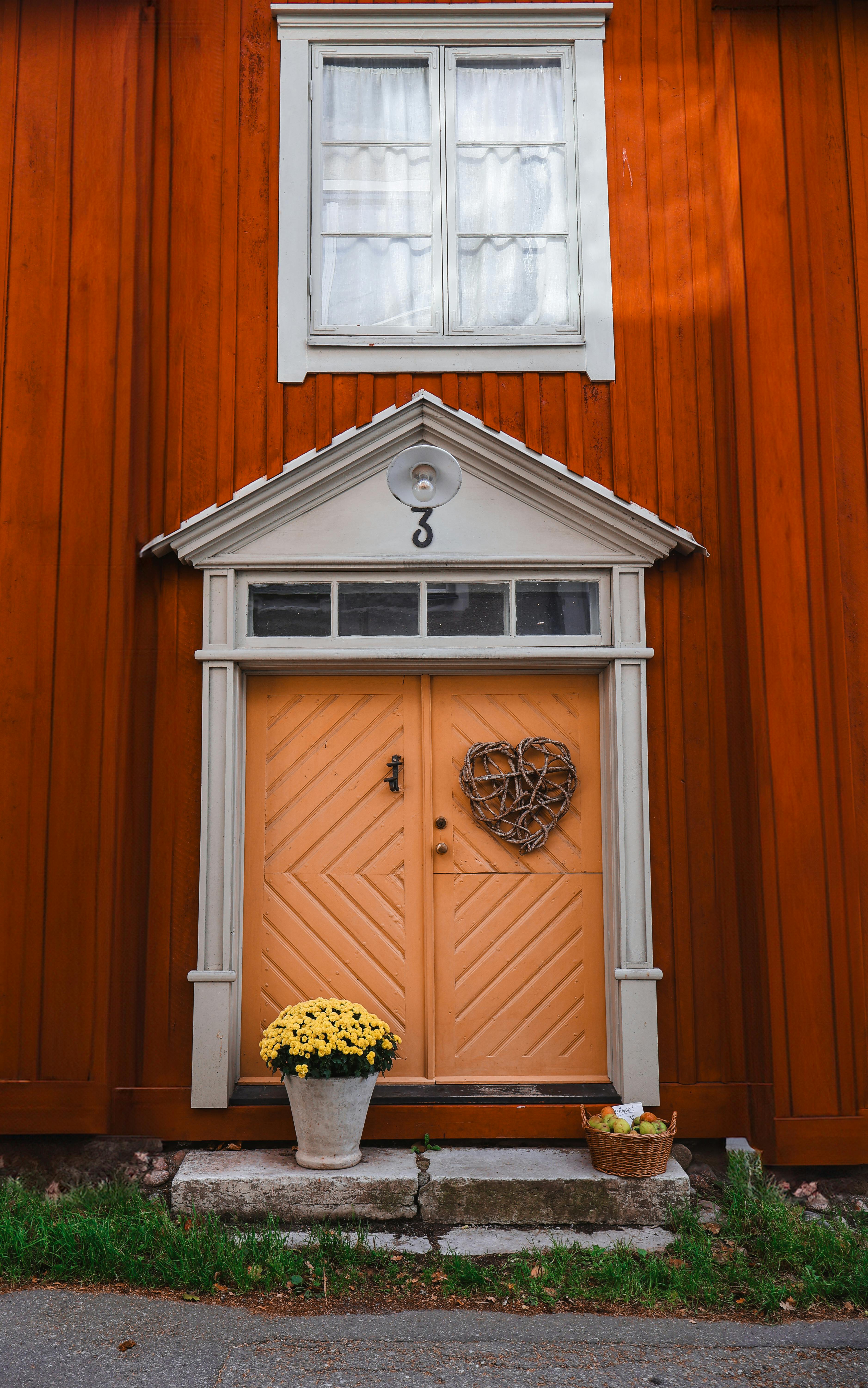 Spring Decor at Double Wing Door · Free Stock Photo