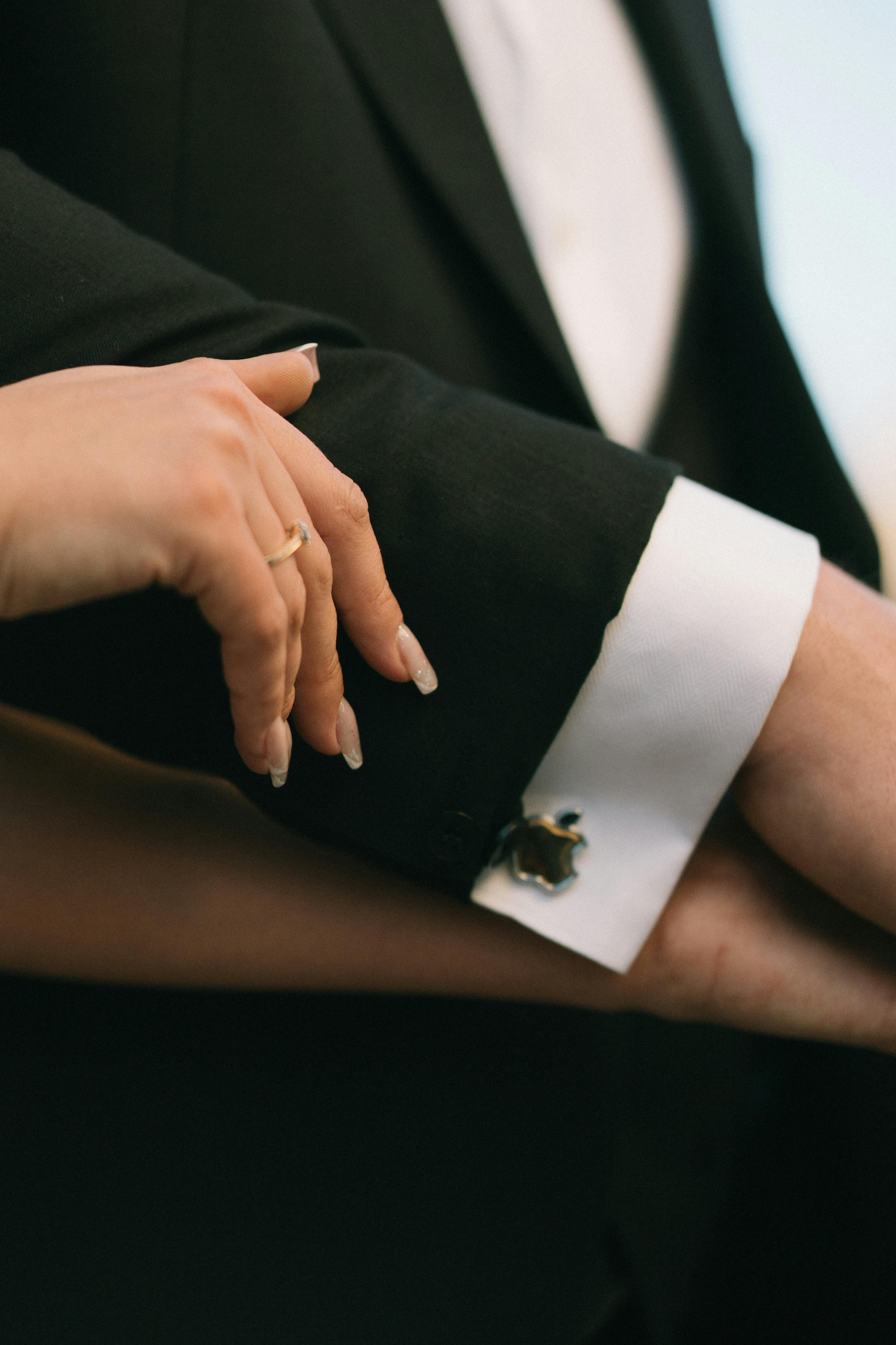 Man in Suit and Woman Hand · Free Stock Photo