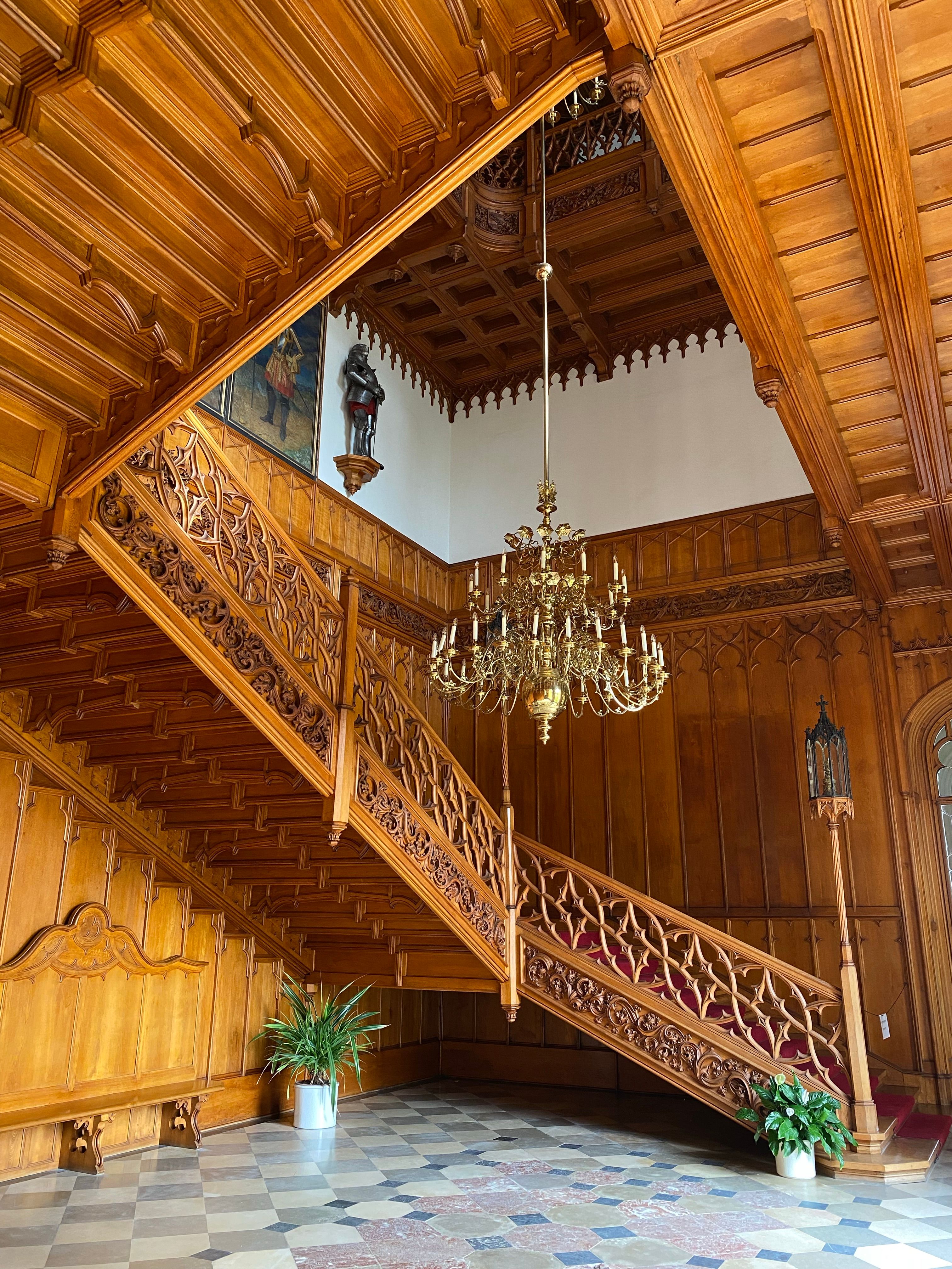 Golden Chandelier Surrounded by Wooden Staircase in Lednice Castle ...