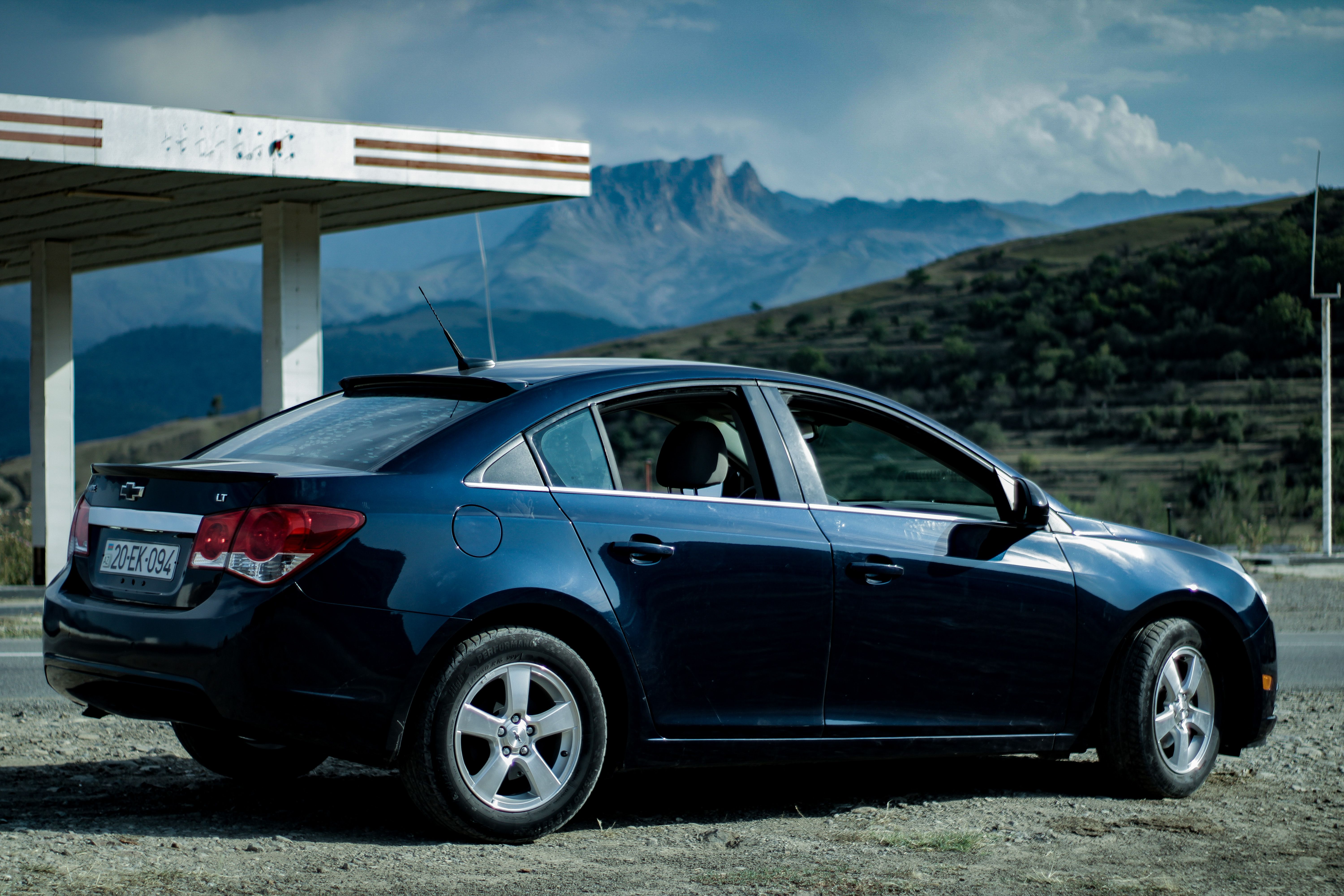 Black Car at a Gas Station · Free Stock Photo