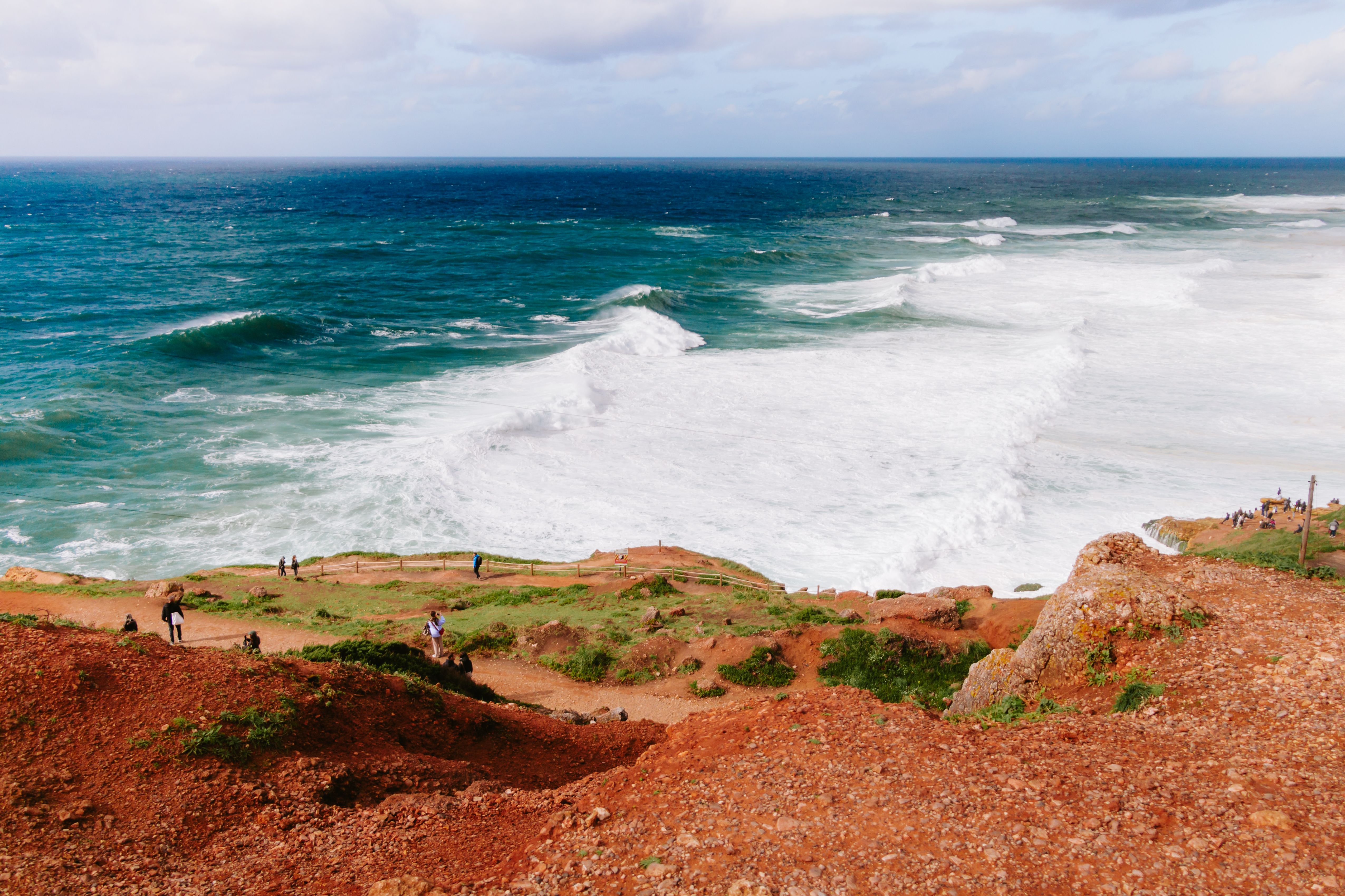 Barren Hill over Sea Coast · Free Stock Photo