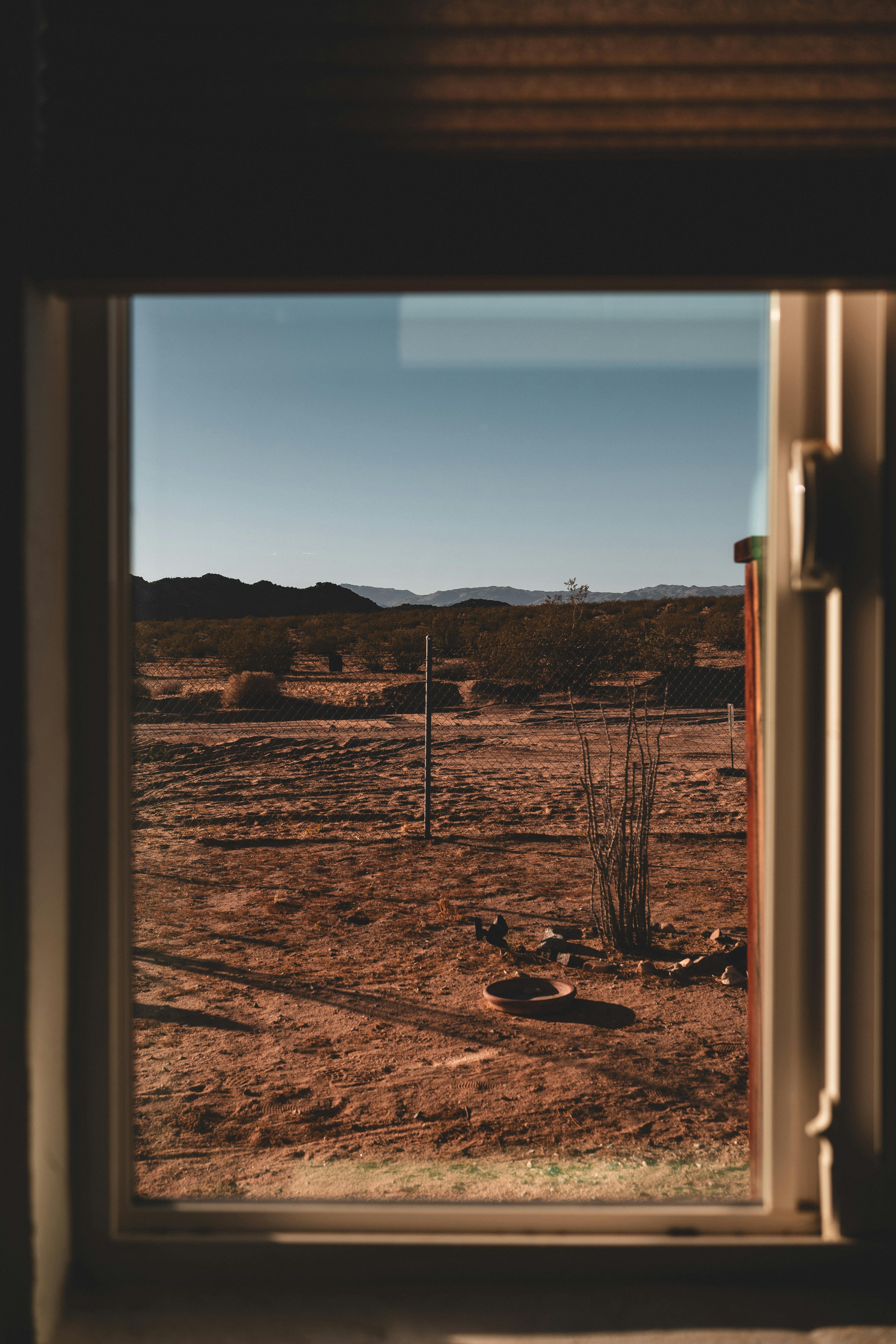 View of a Desert through a Window · Free Stock Photo