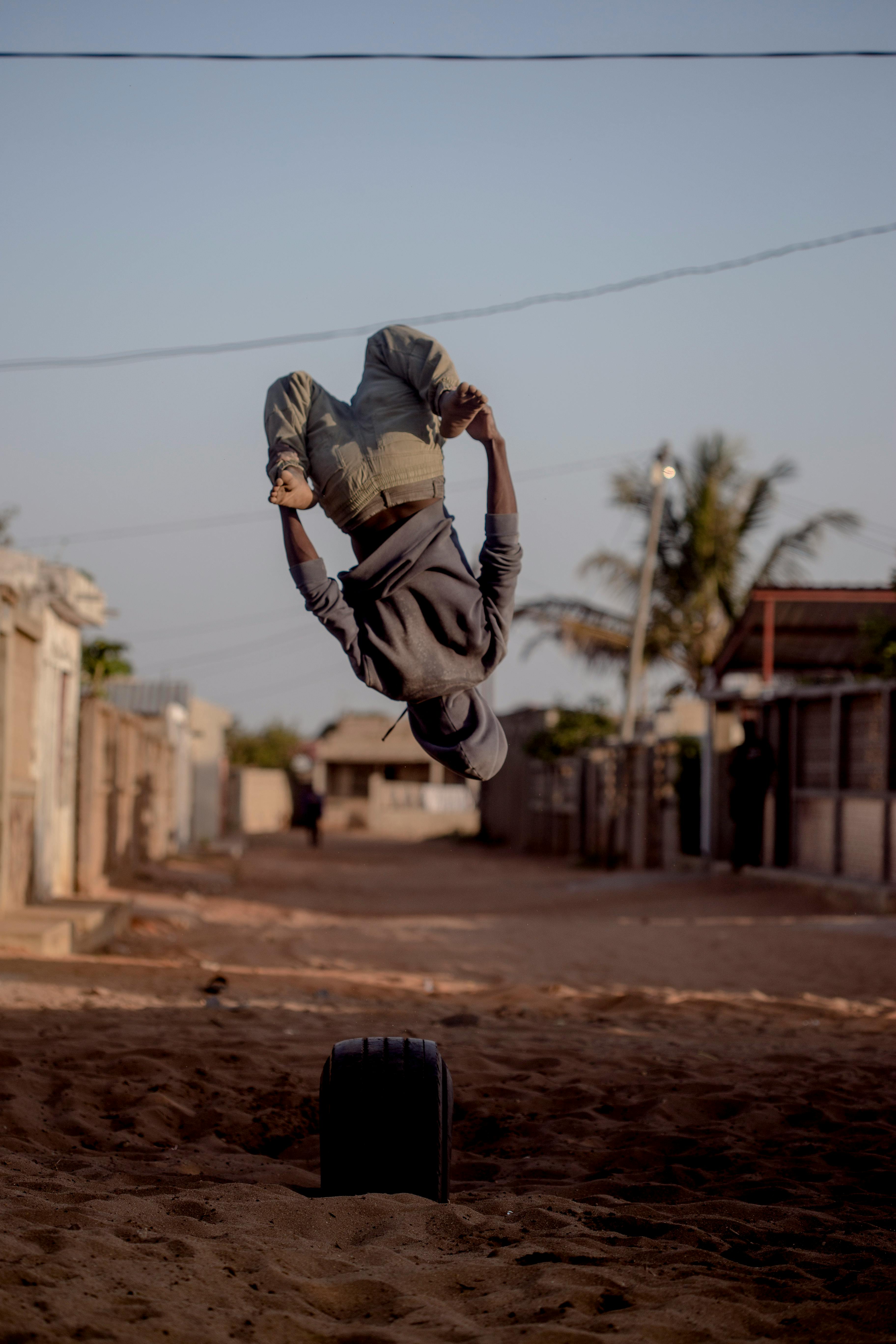 Photo of a Man Doing a Flip in the Air · Free Stock Photo