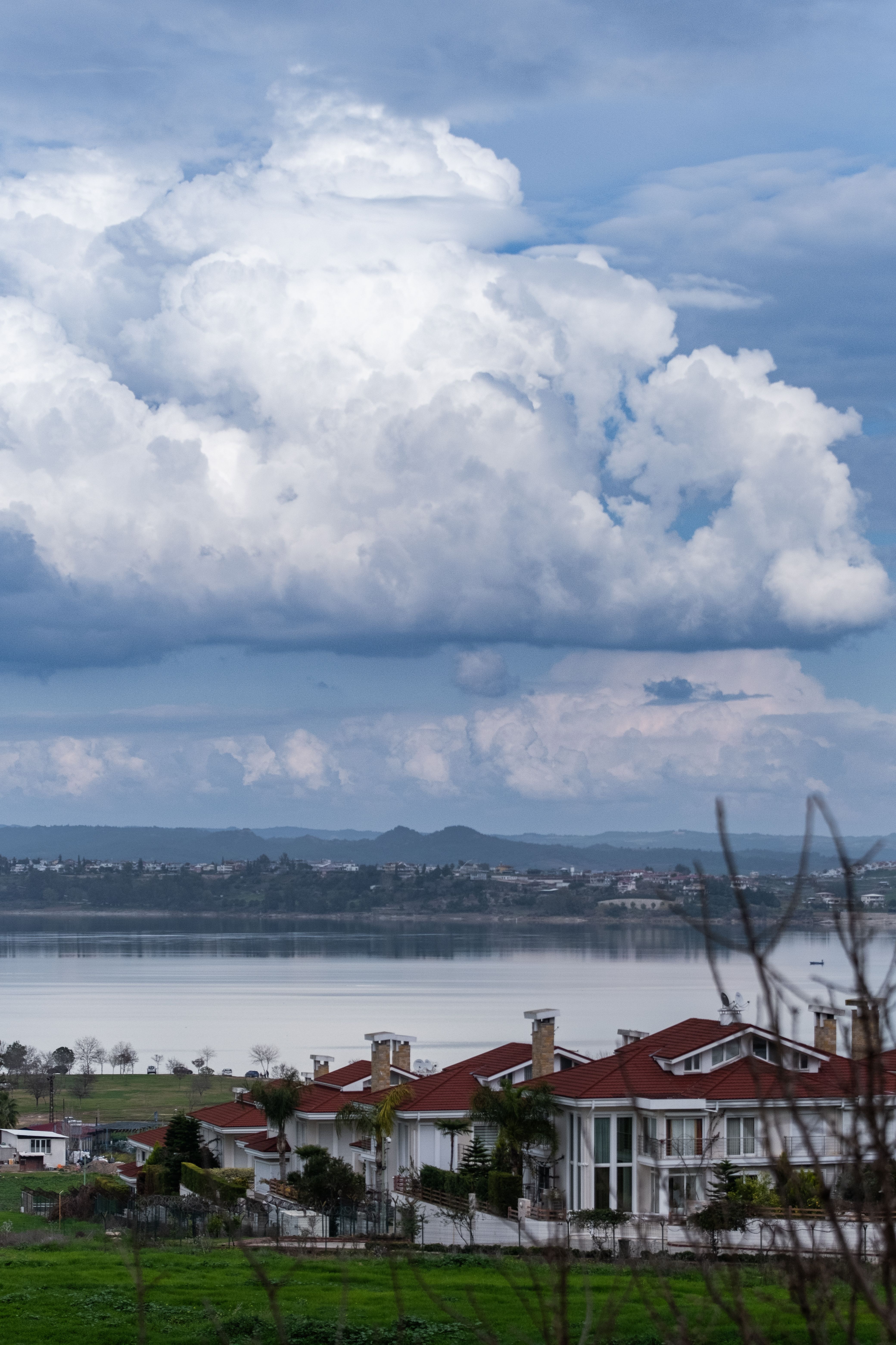 Rain Clouds over River · Free Stock Photo