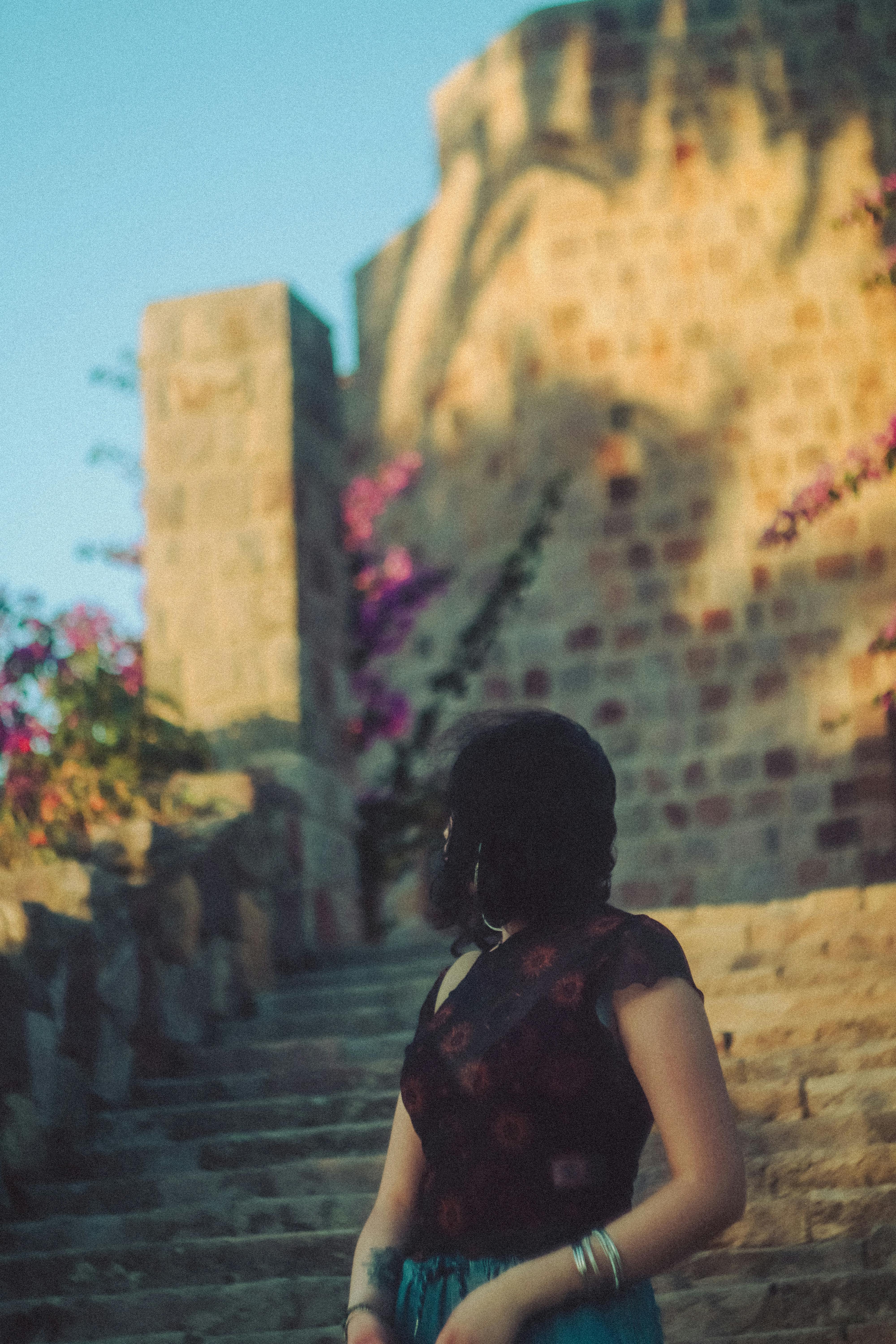 Portrait of Brunette Woman Looking Back · Free Stock Photo