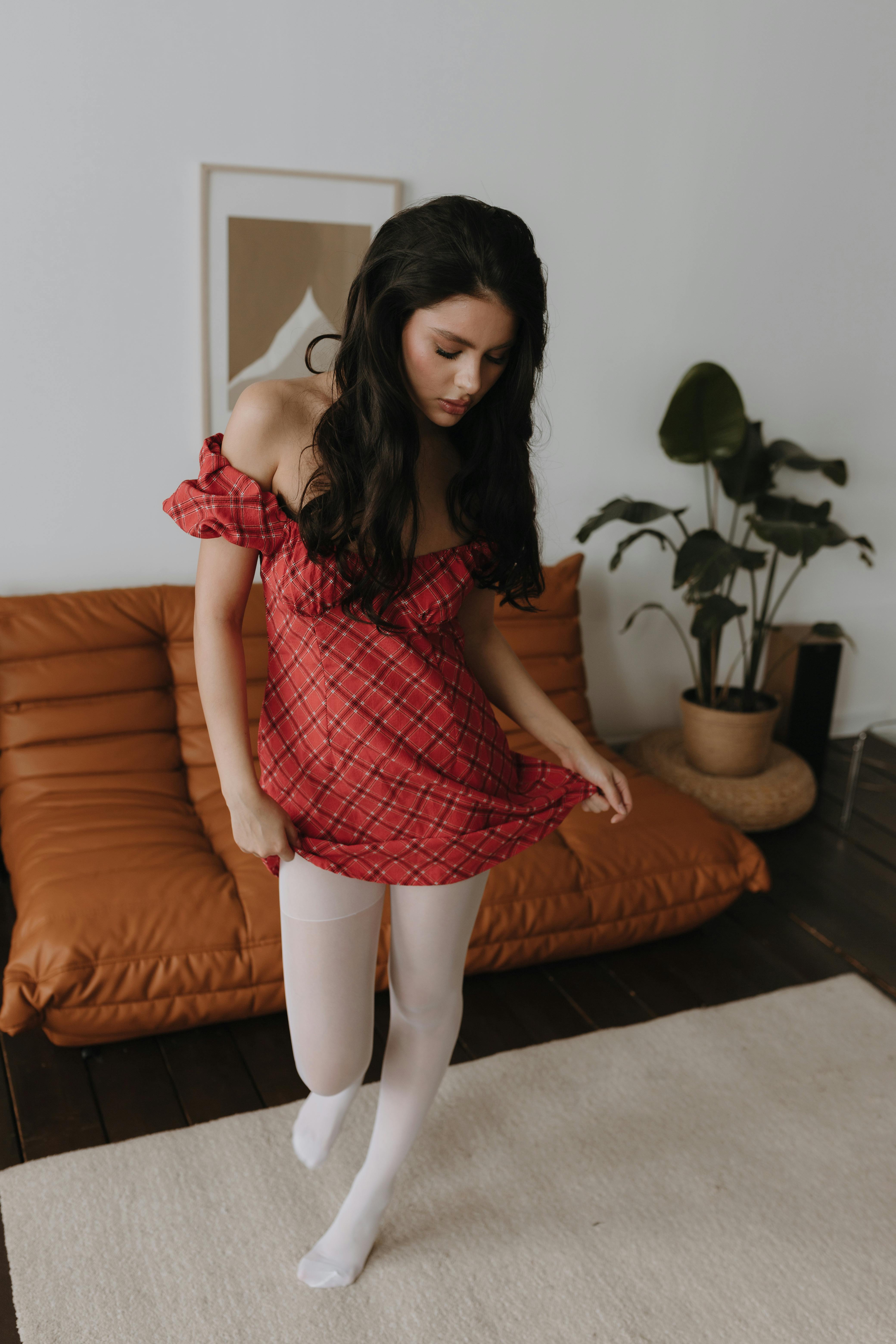 Dancing Woman in Mini Dress and Pantyhose · Free Stock Photo