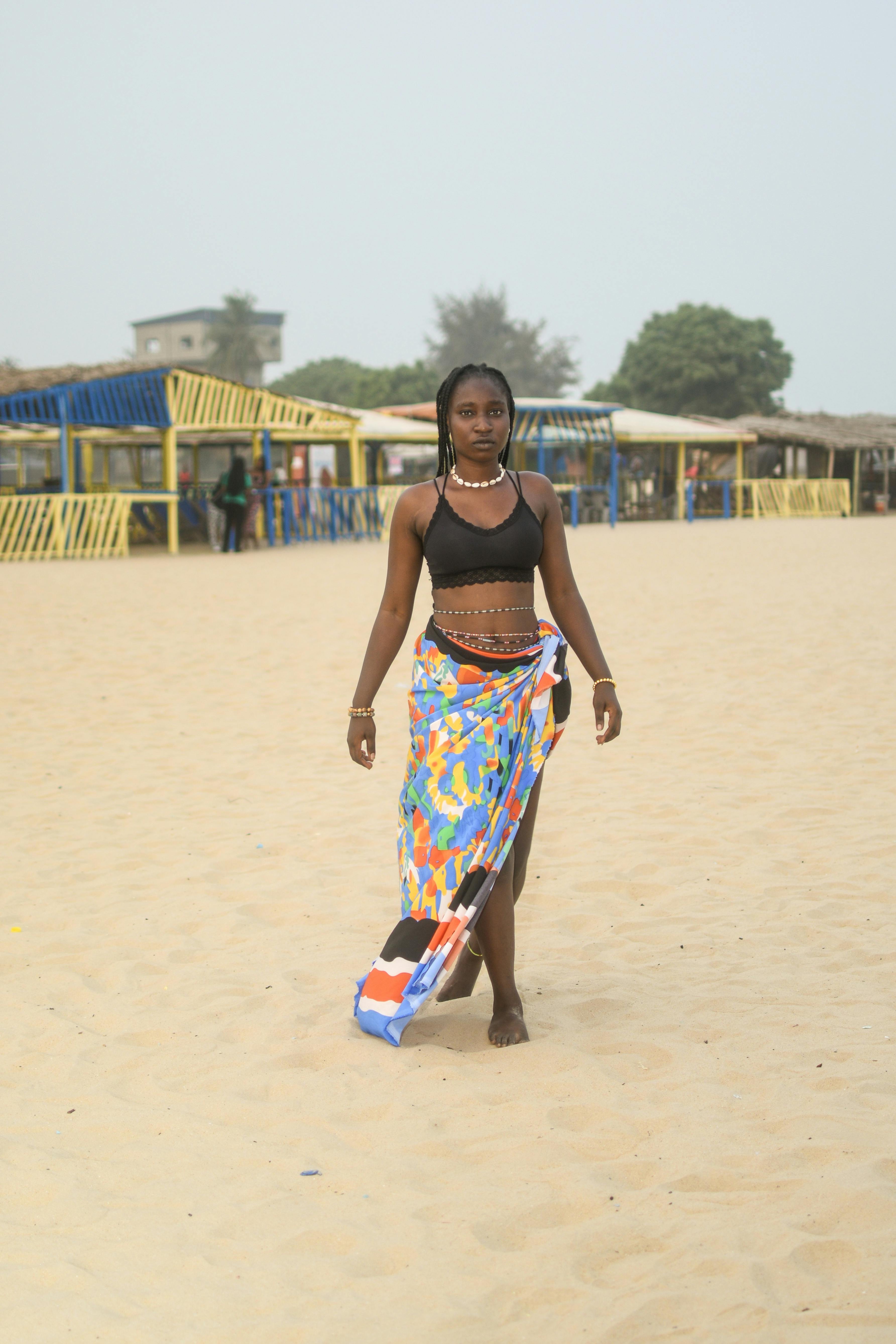 Woman in Bra Walking on Beach in Summer · Free Stock Photo
