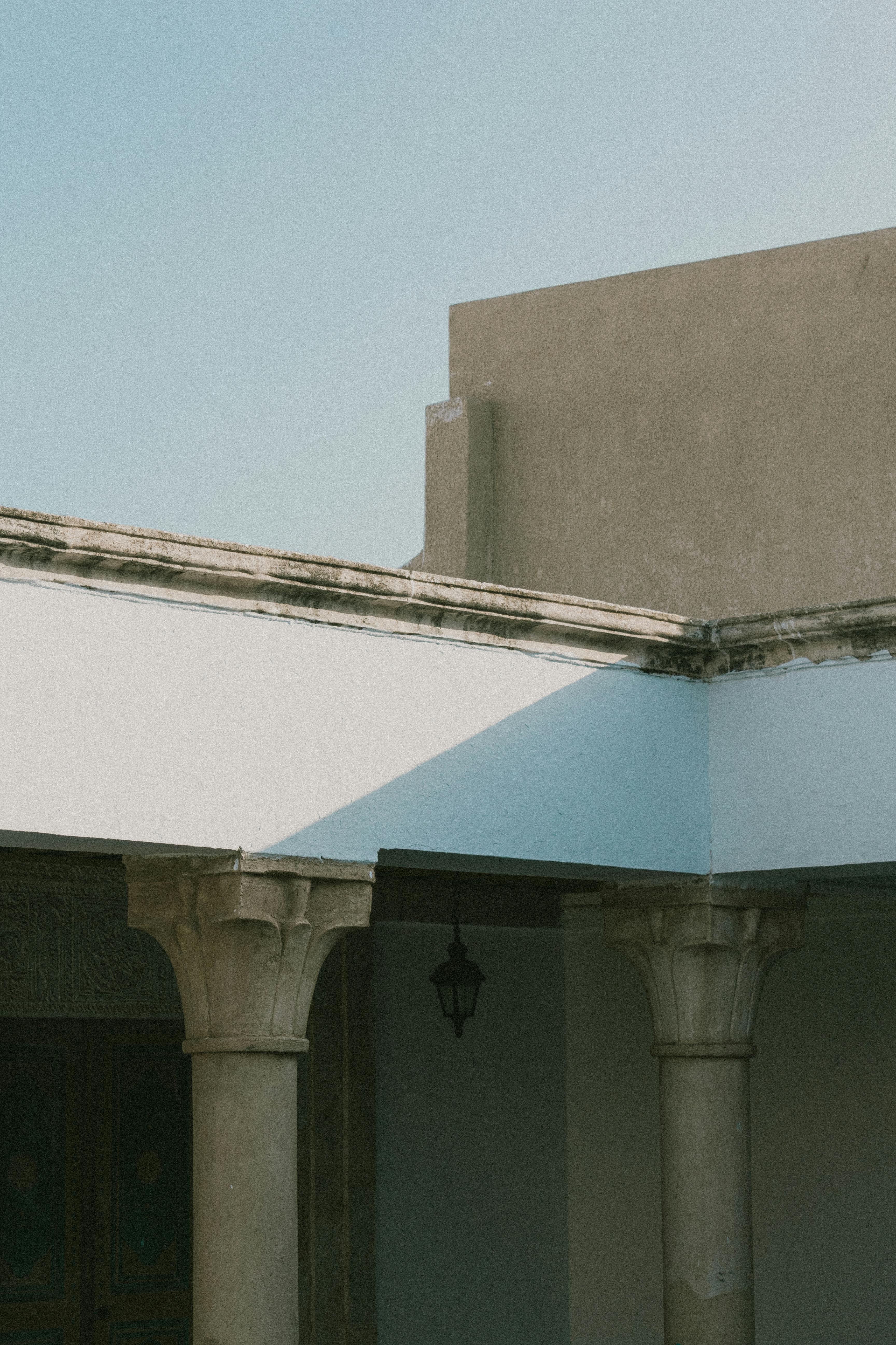 Columns in Building Corner · Free Stock Photo