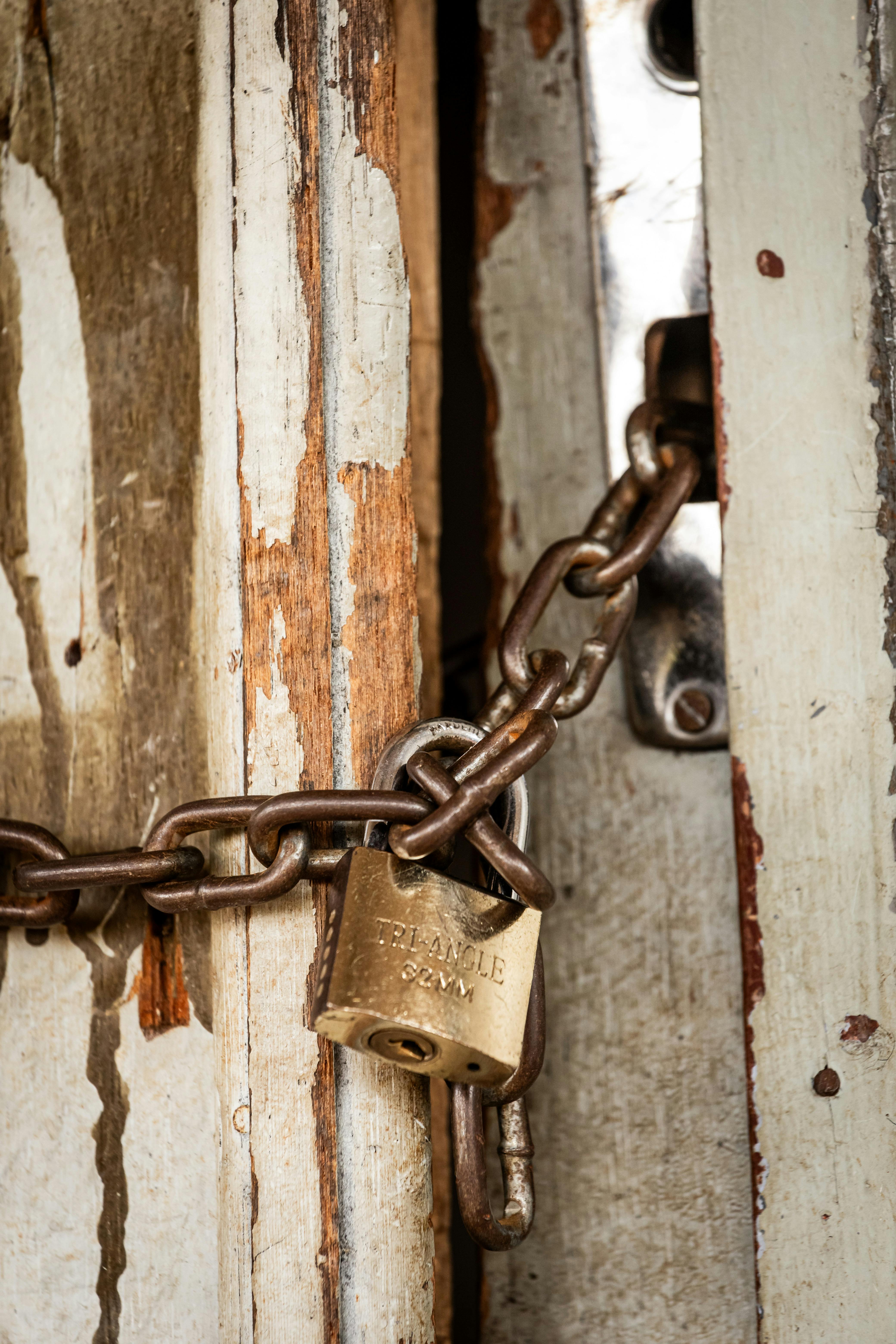 Brass-colored Metal Padlock With Chain · Free Stock Photo