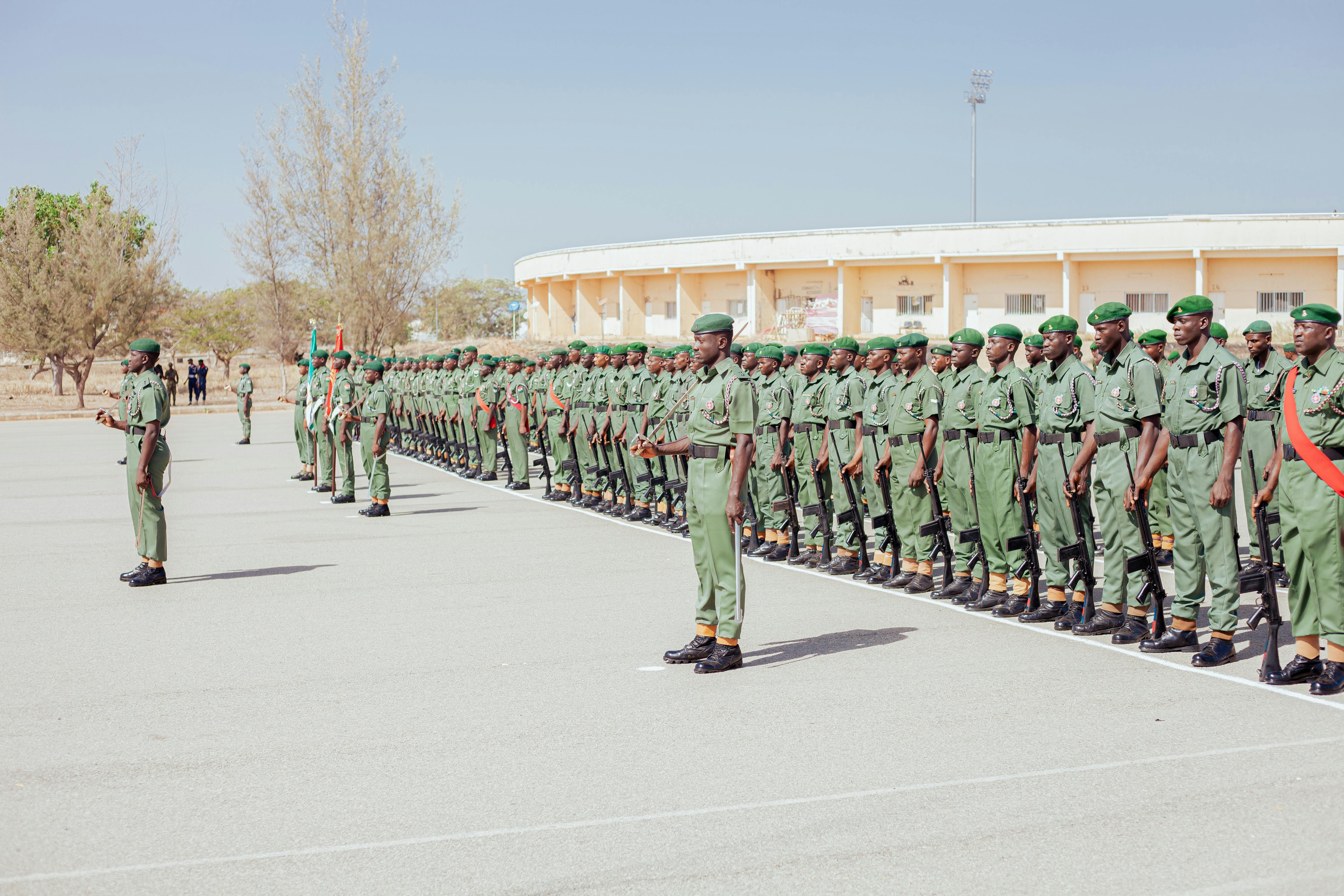Soldiers in Muster on Sunlit Square · Free Stock Photo