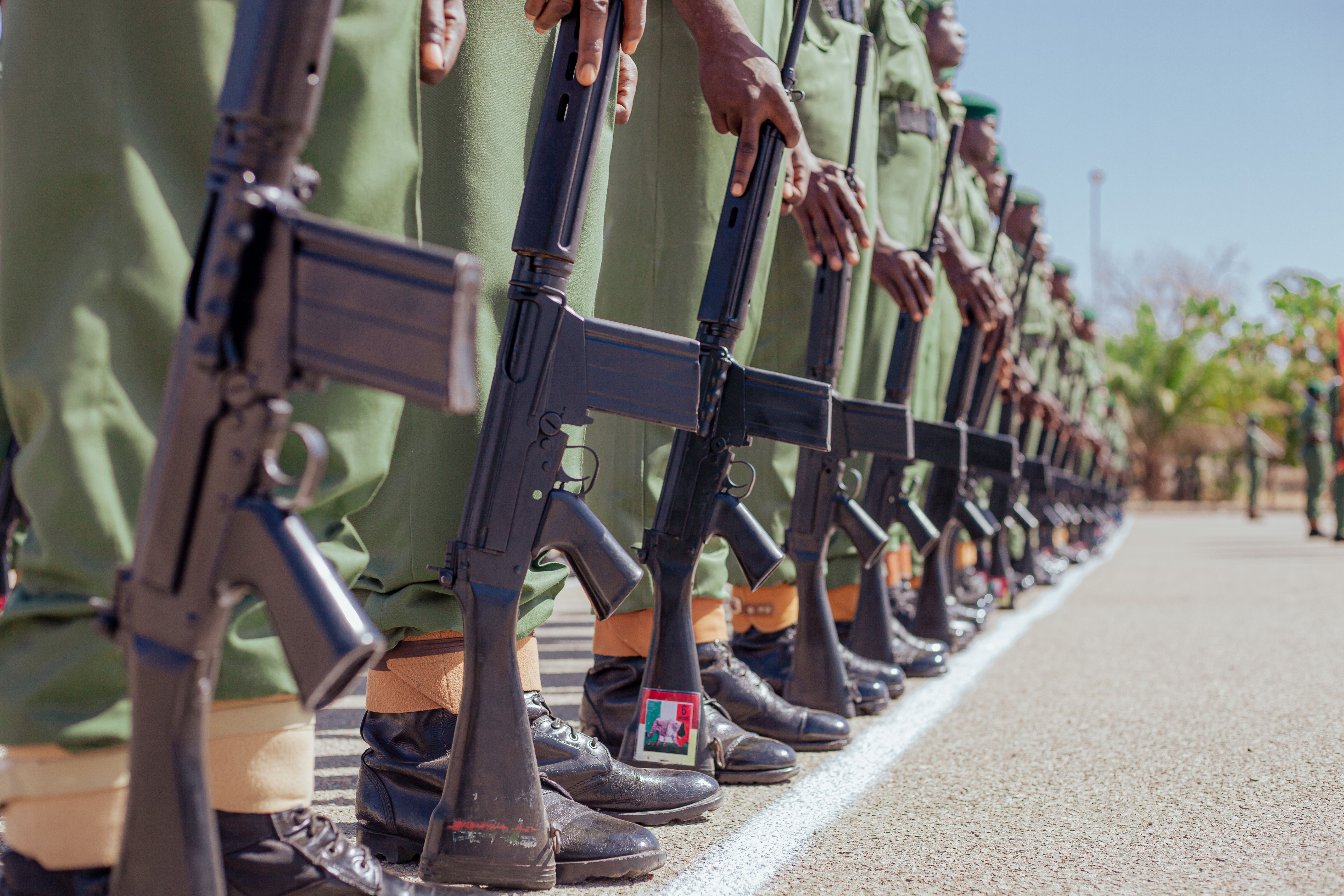 Row of Soldiers with Weapons · Free Stock Photo