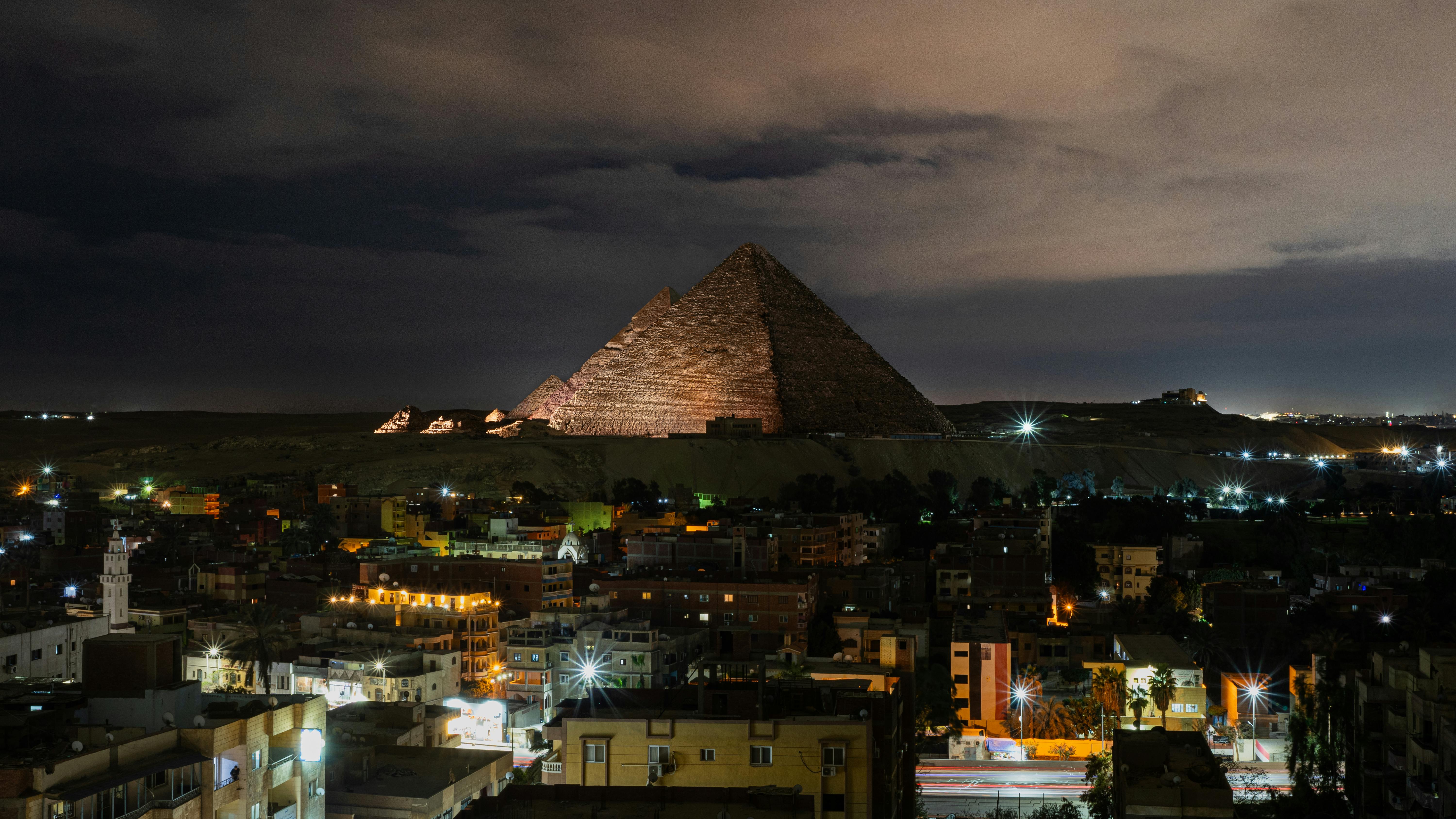 Giza City and Pyramids at Night · Free Stock Photo