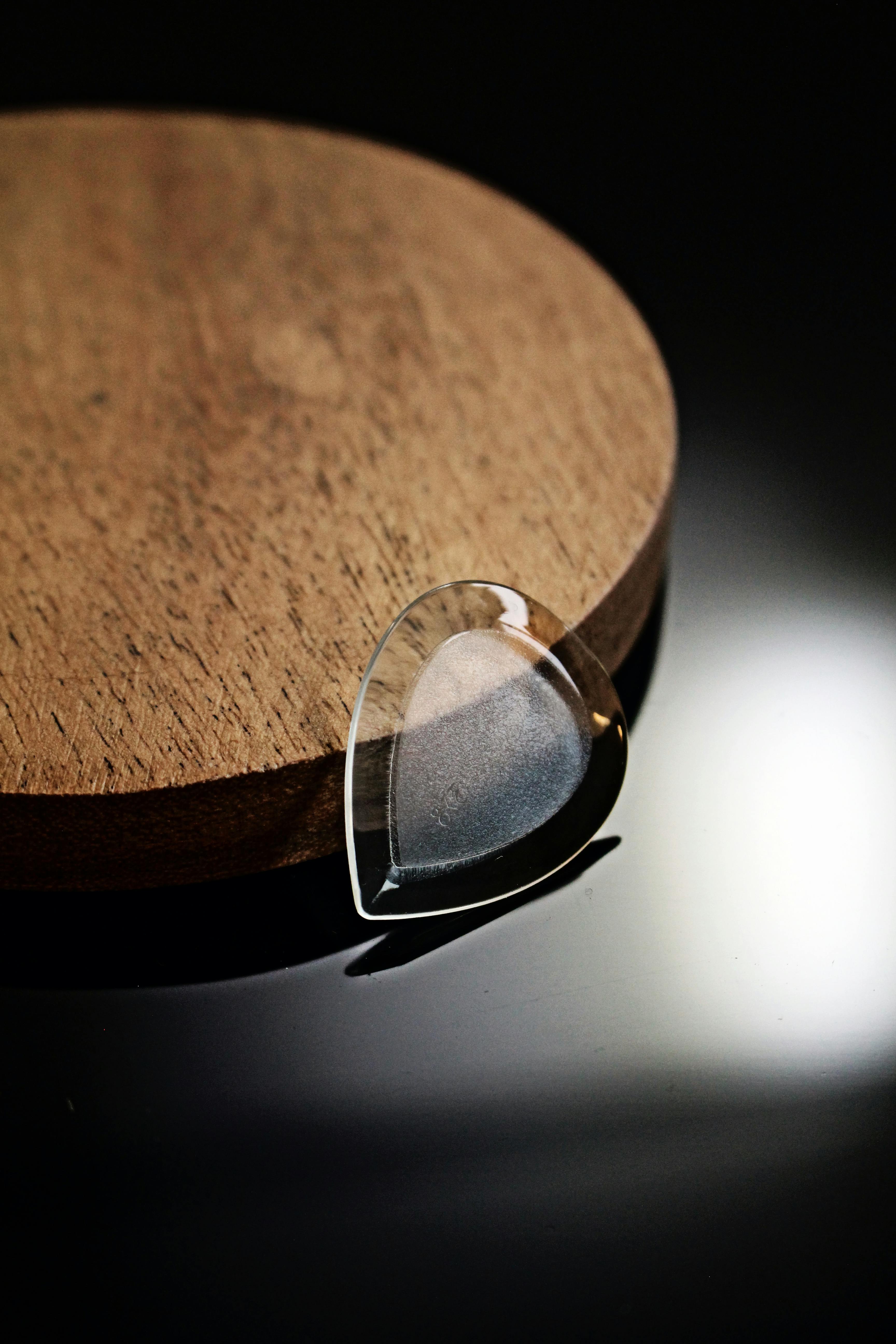 Guitar Pick and Wooden Board · Free Stock Photo